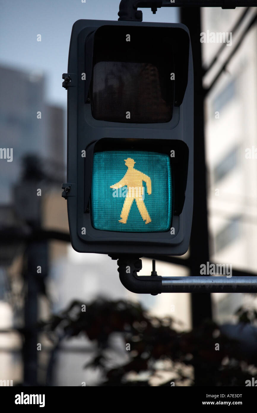Green walk sign at pedestrian crossing in city of Tokyo Japan Asia ...