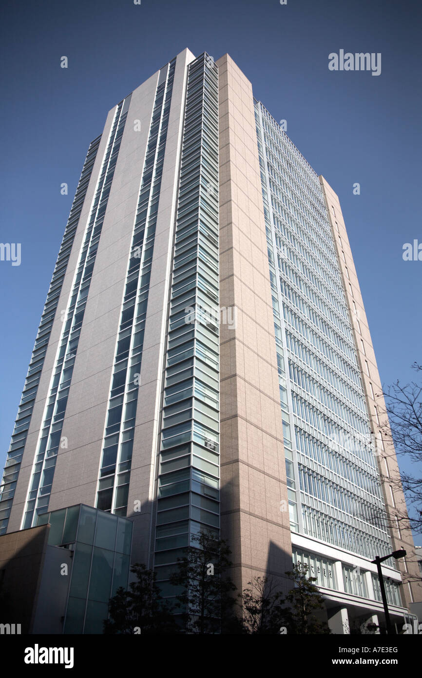Tall modern commercial office skyscraper building in city of Tokyo ...