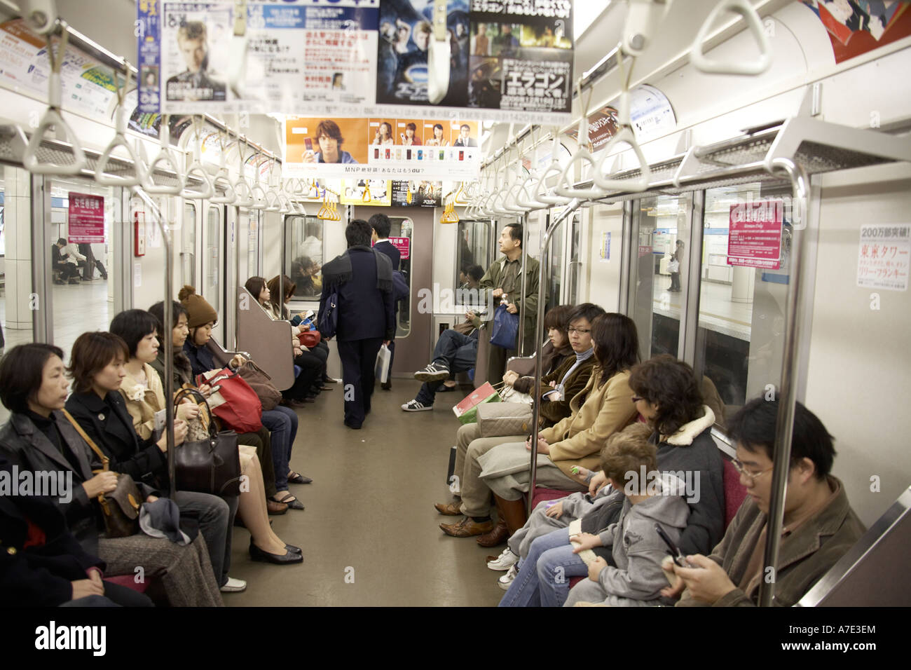Passengers on underground Subway train in city of Tokyo Japan Asia ...