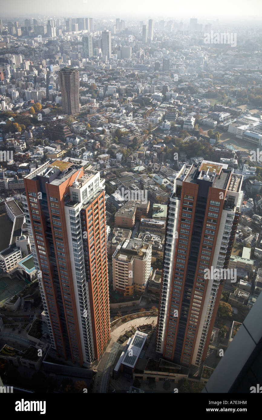 High level oblique aerial panorama south east of tower blocks from ...