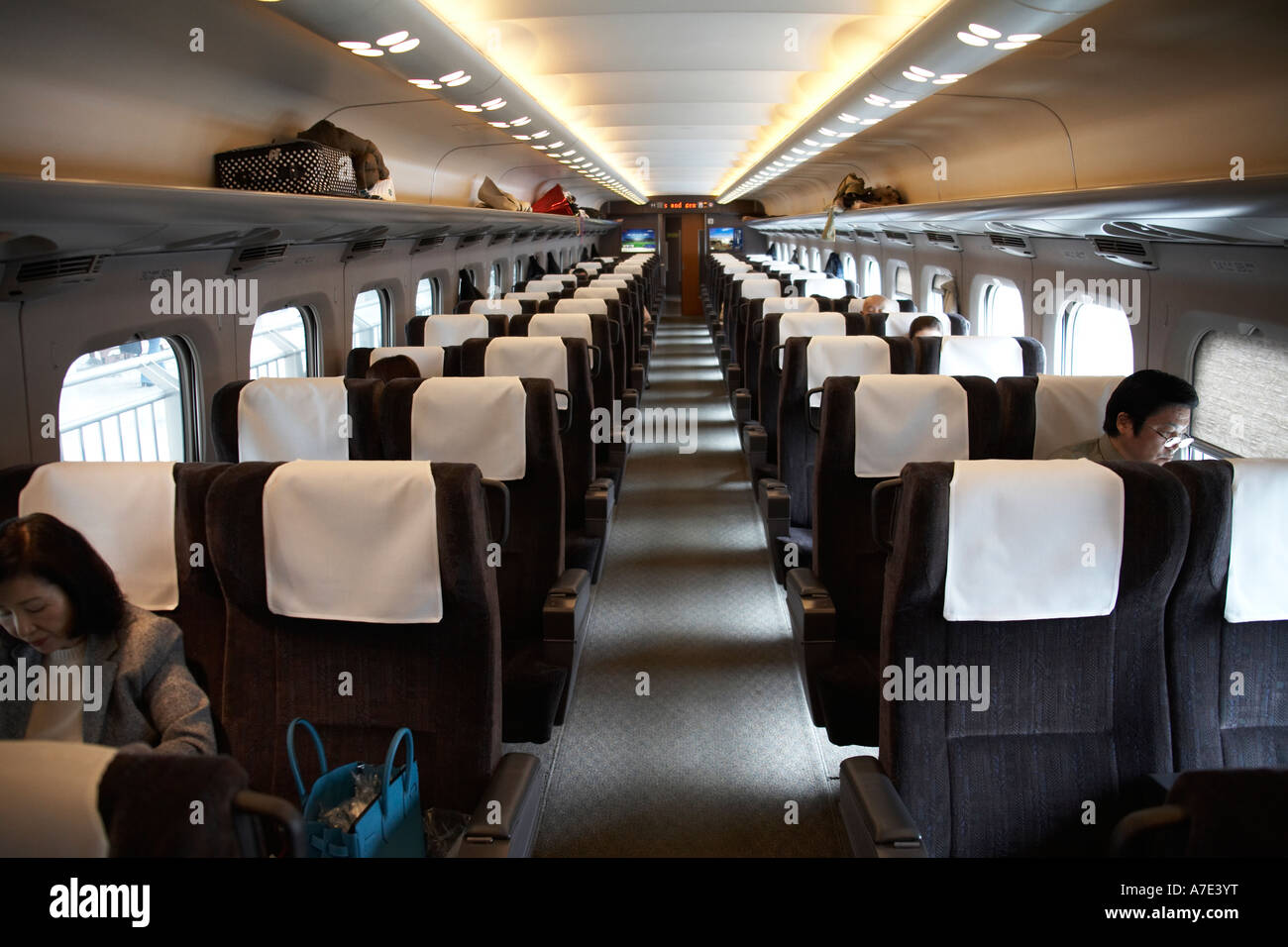 Japan Railways Shinkansen Super express Nozomi Bullet train interior with passengers Japan Asia ...