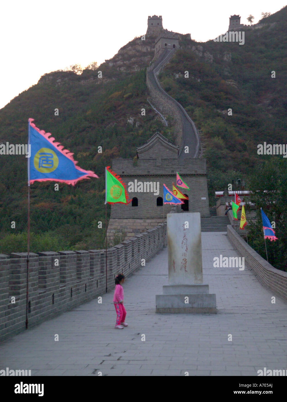 child reading Mao's stone at great wall of China Stock Photo - Alamy