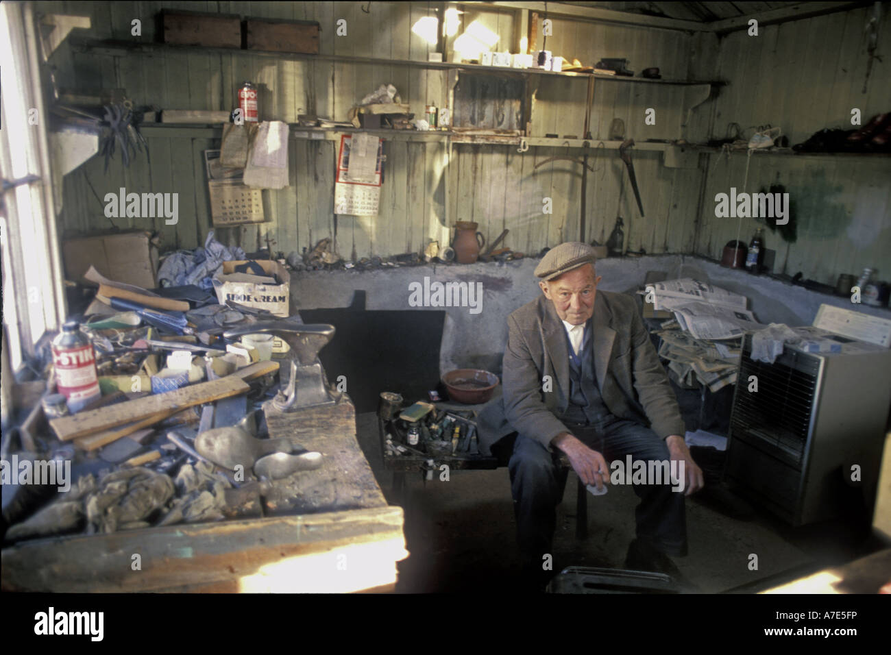 Europe Ireland Cork Ballydehob an elderly shoemaker in his shop Stock ...