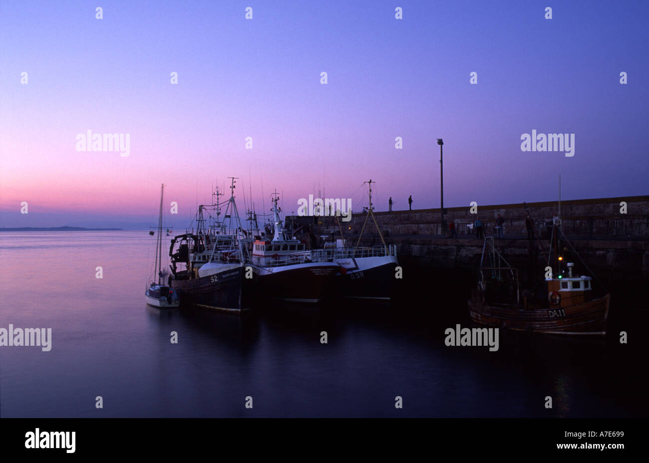 Fishing boats and trawler in harbour Port Oriel Co Louth Ireland Stock ...