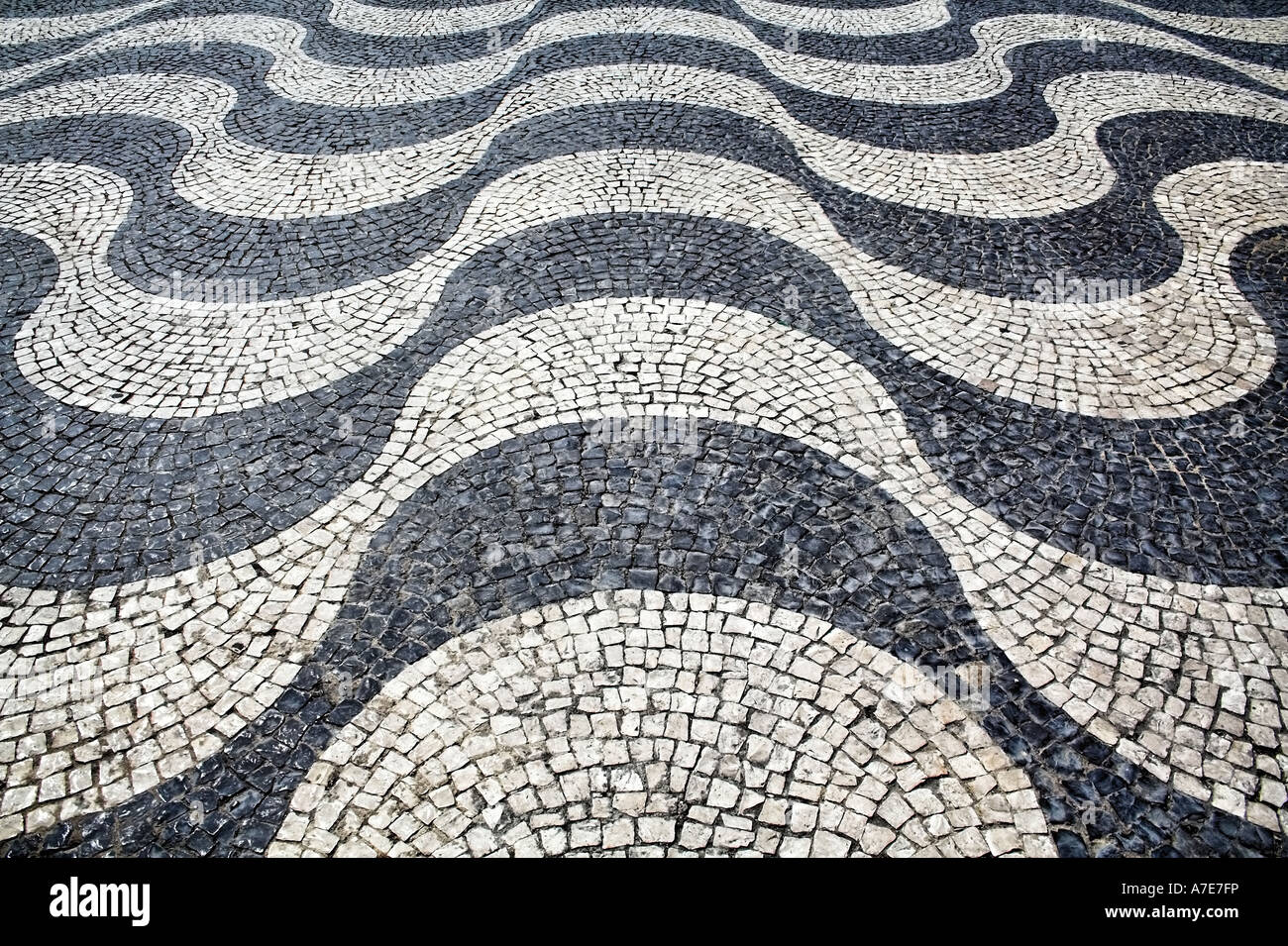 Detail of a typical portuguese cobblestone handmade pavement in Lisbon ...