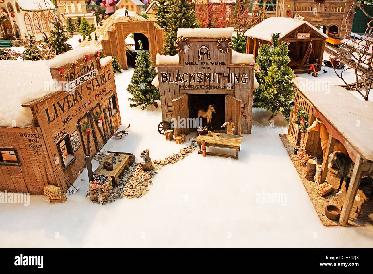 Image of a model train town blacksmithing shop and livery stable with ...