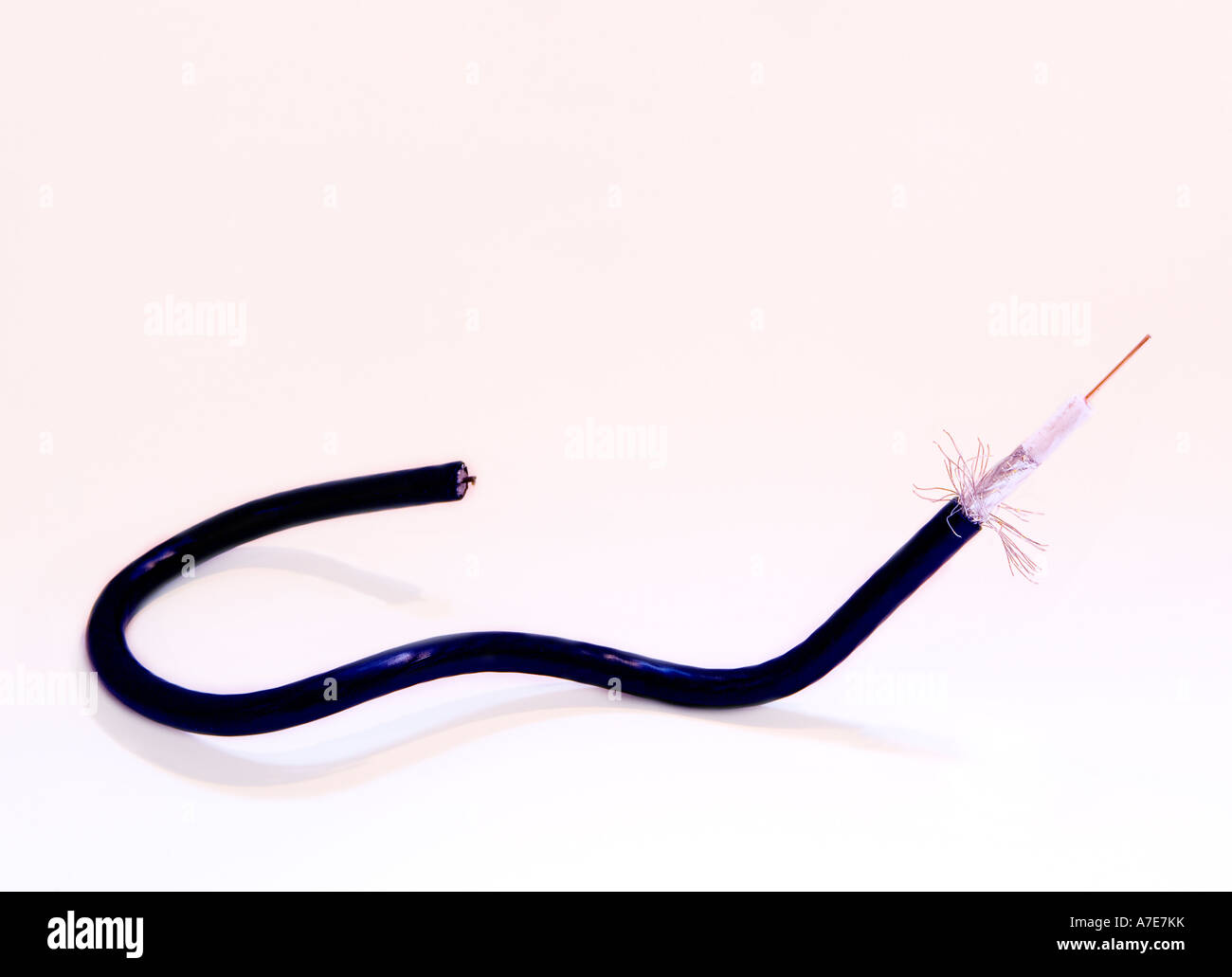 Image of a short section of coaxial cable with the end stripped to show ...