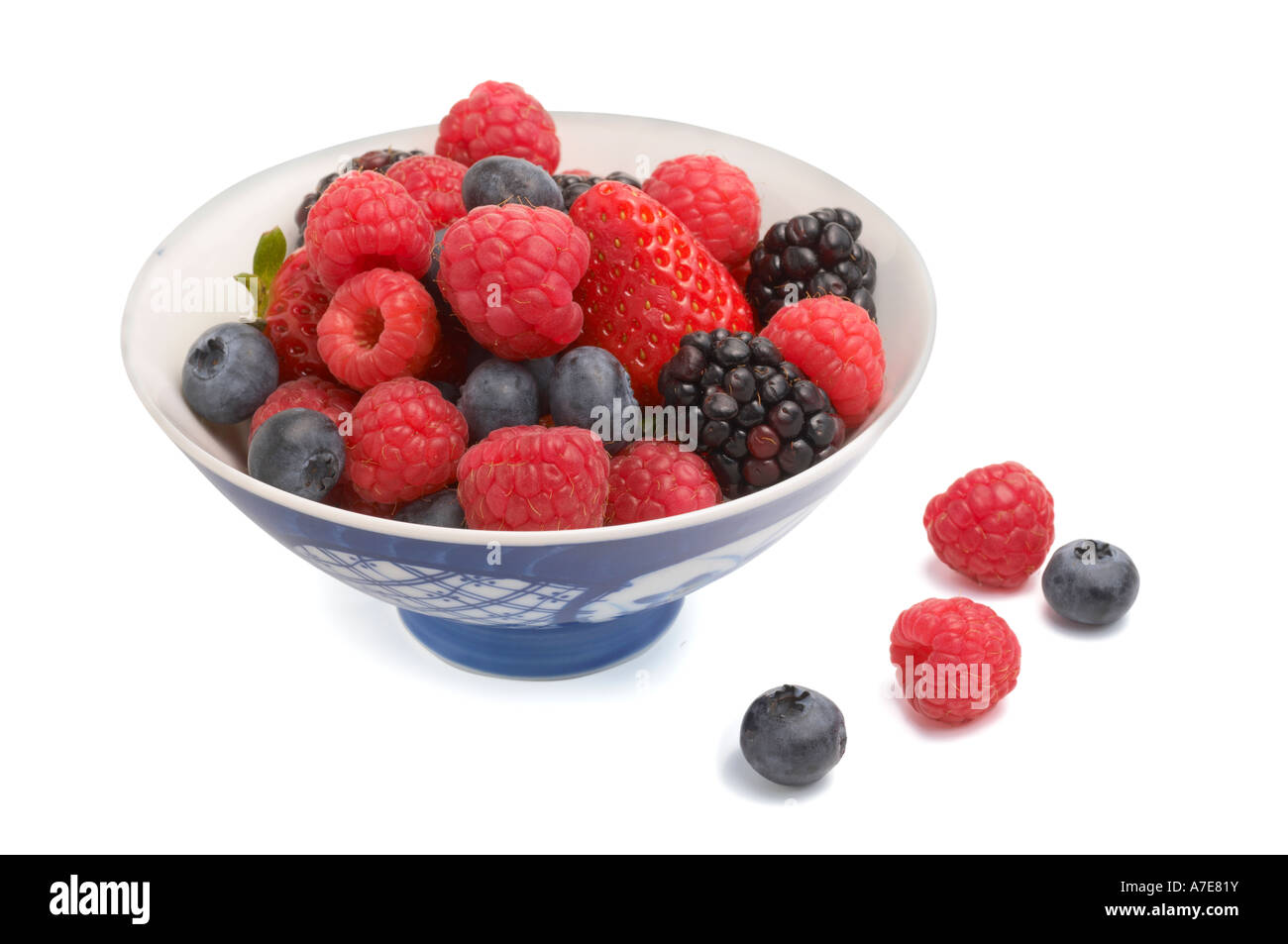 Bowl of soft fruits strawberry blackberry blueberry and raspberry with ...
