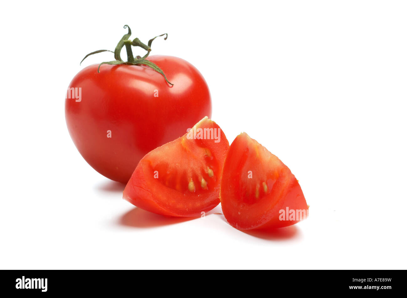 Tomato and tomato segments Stock Photo - Alamy