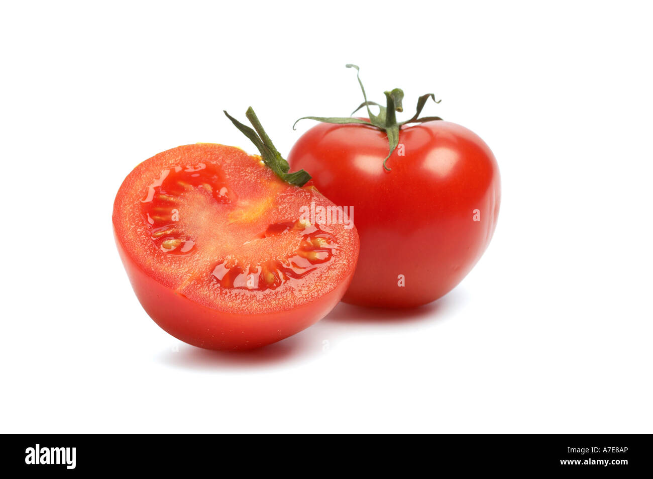 Cut in half tomato Cut Out Stock Images & Pictures - Alamy