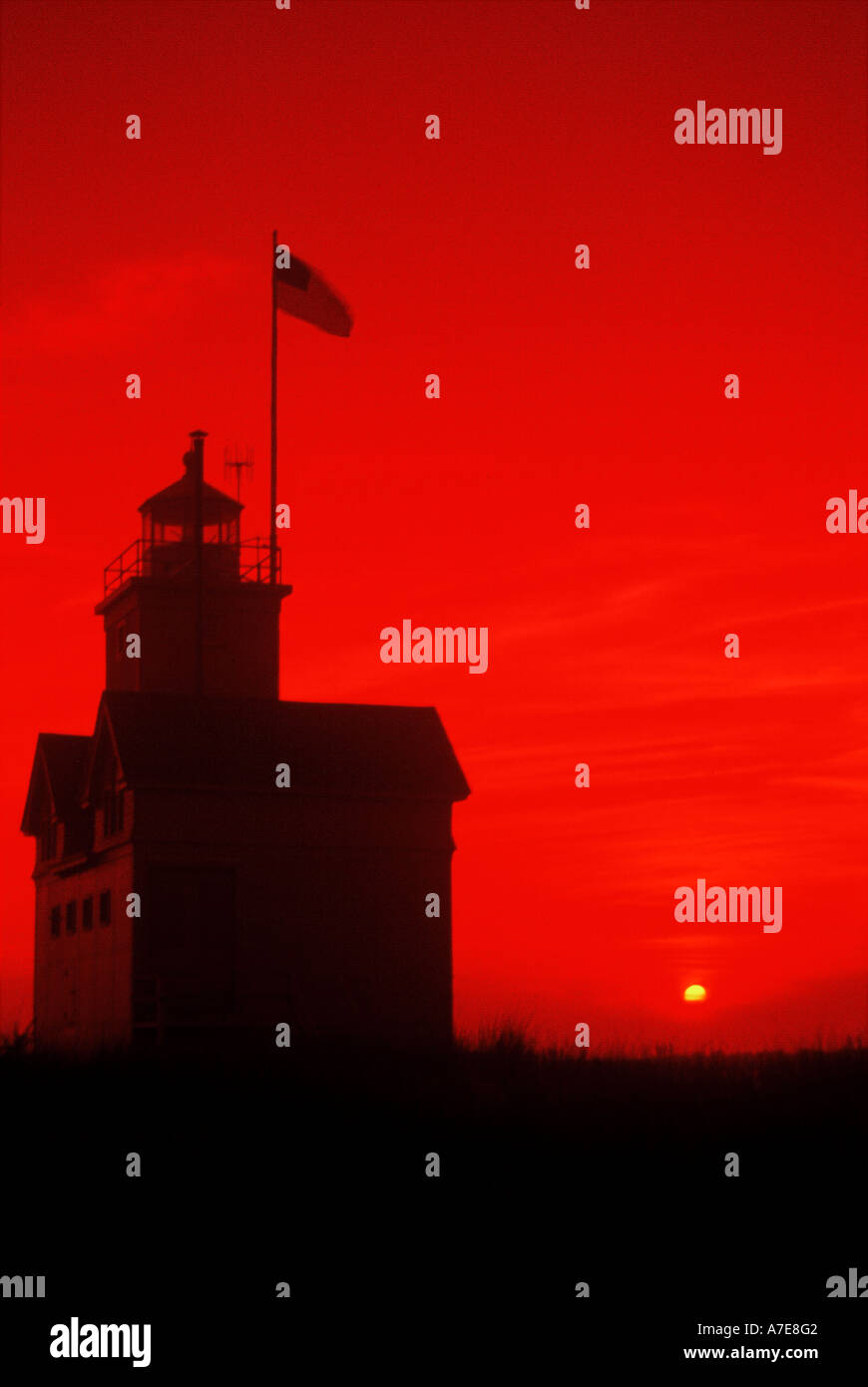 Famous Holland Michigan Red Lighthouse on the Great Lakes at sunset ...