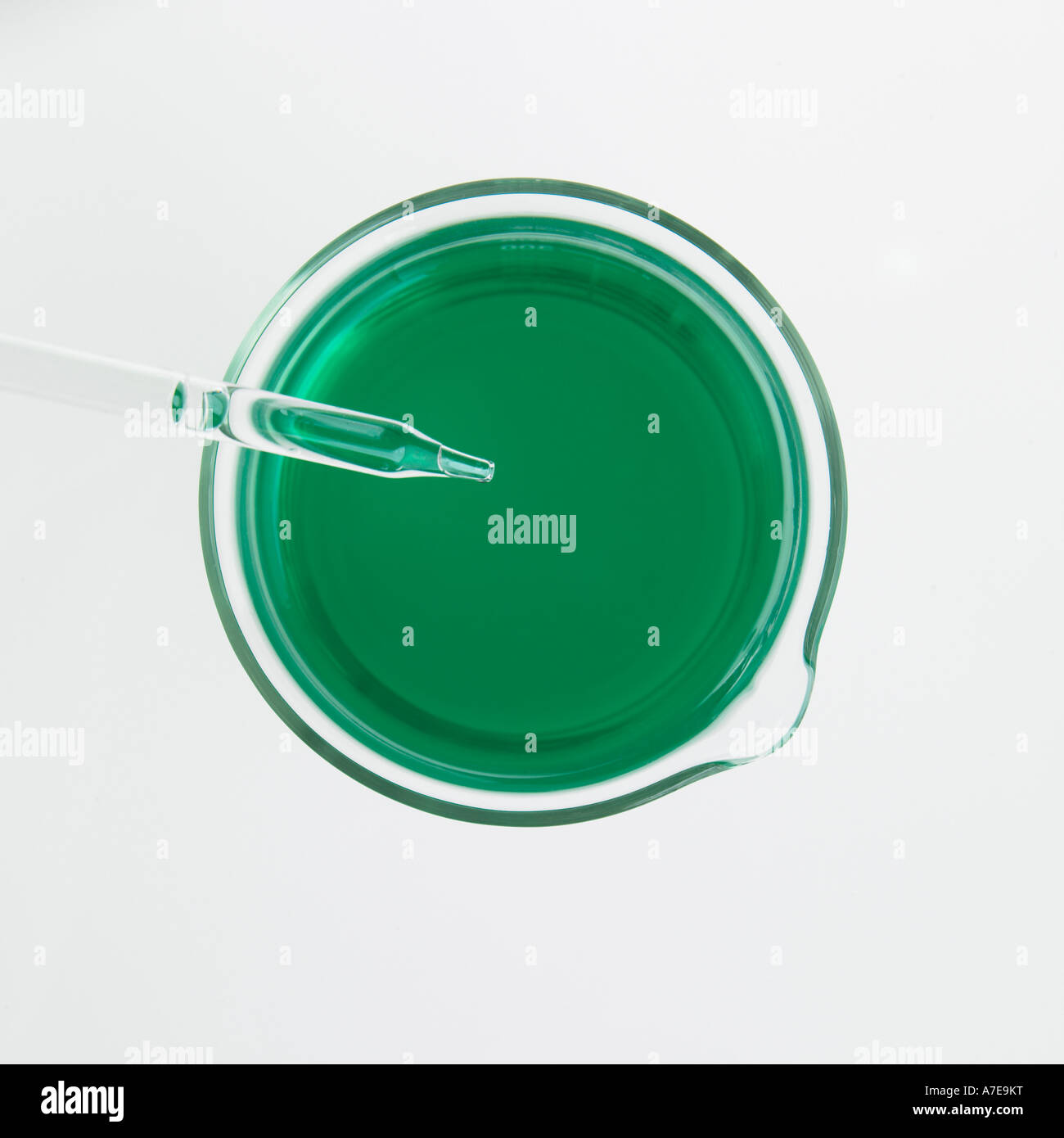 I pipette over a beaker Stock Photo - Alamy