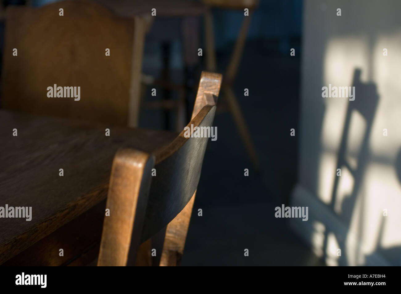 Pub chair shadow Stock Photo - Alamy