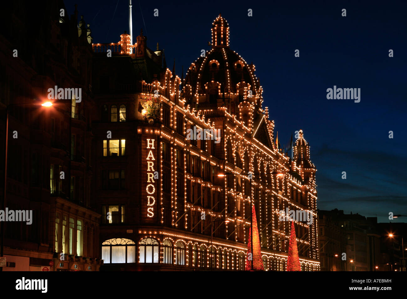 Harrods department store illuminated at night, Knightsbridge, London ...