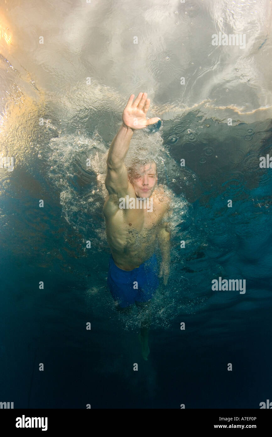 Man swimming in swimming pool Stock Photo - Alamy
