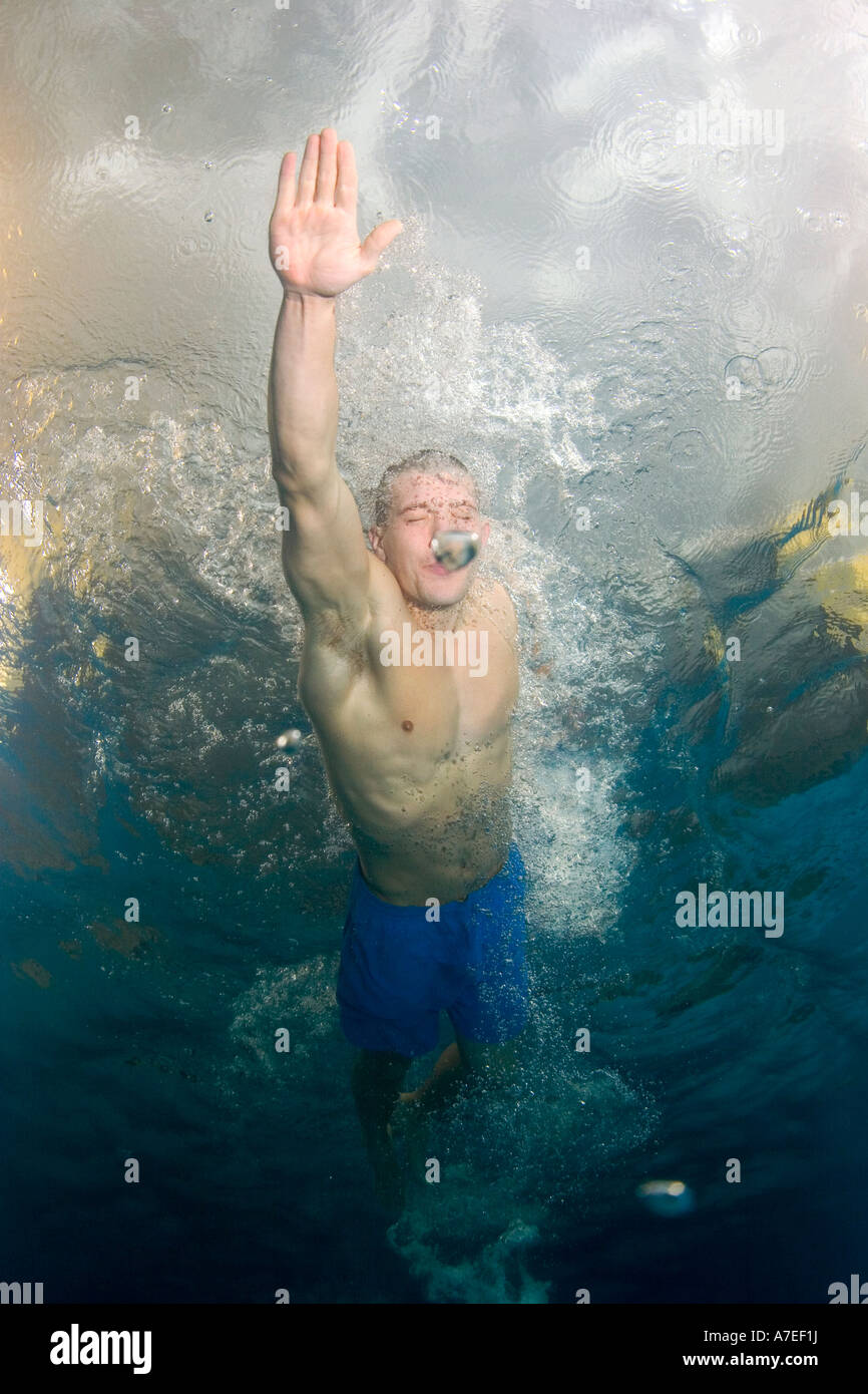 Man swimming in swimming pool Stock Photo - Alamy
