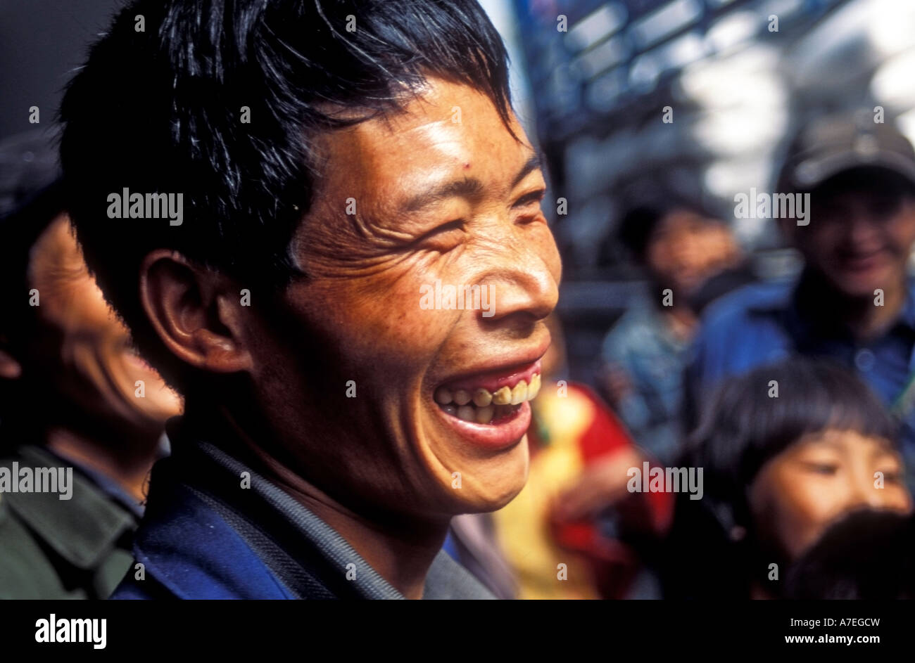 Happy face of an Asian man laughing Stock Photo - Alamy