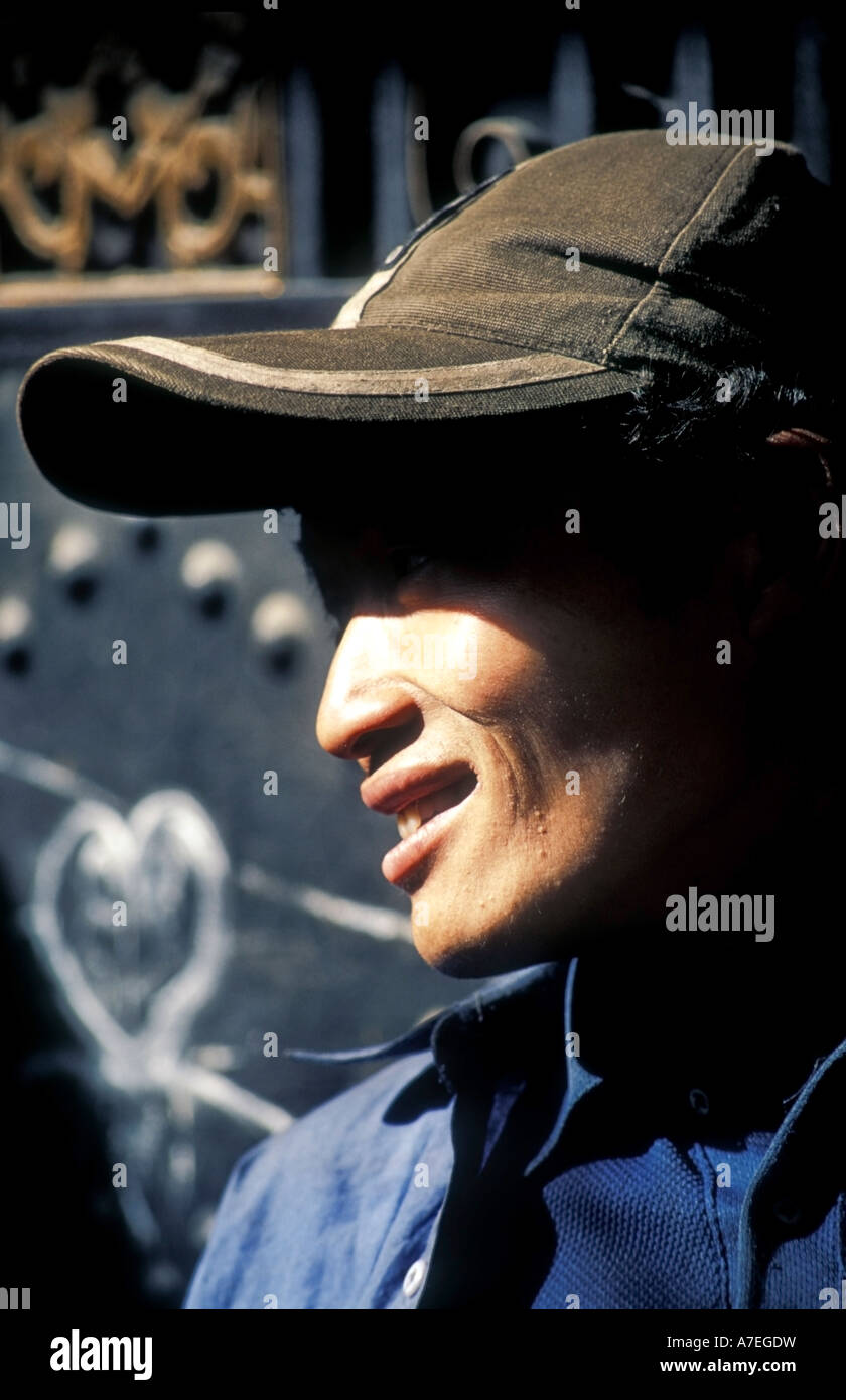 Man wearing a cap his eyes obscured by shadow Stock Photo - Alamy