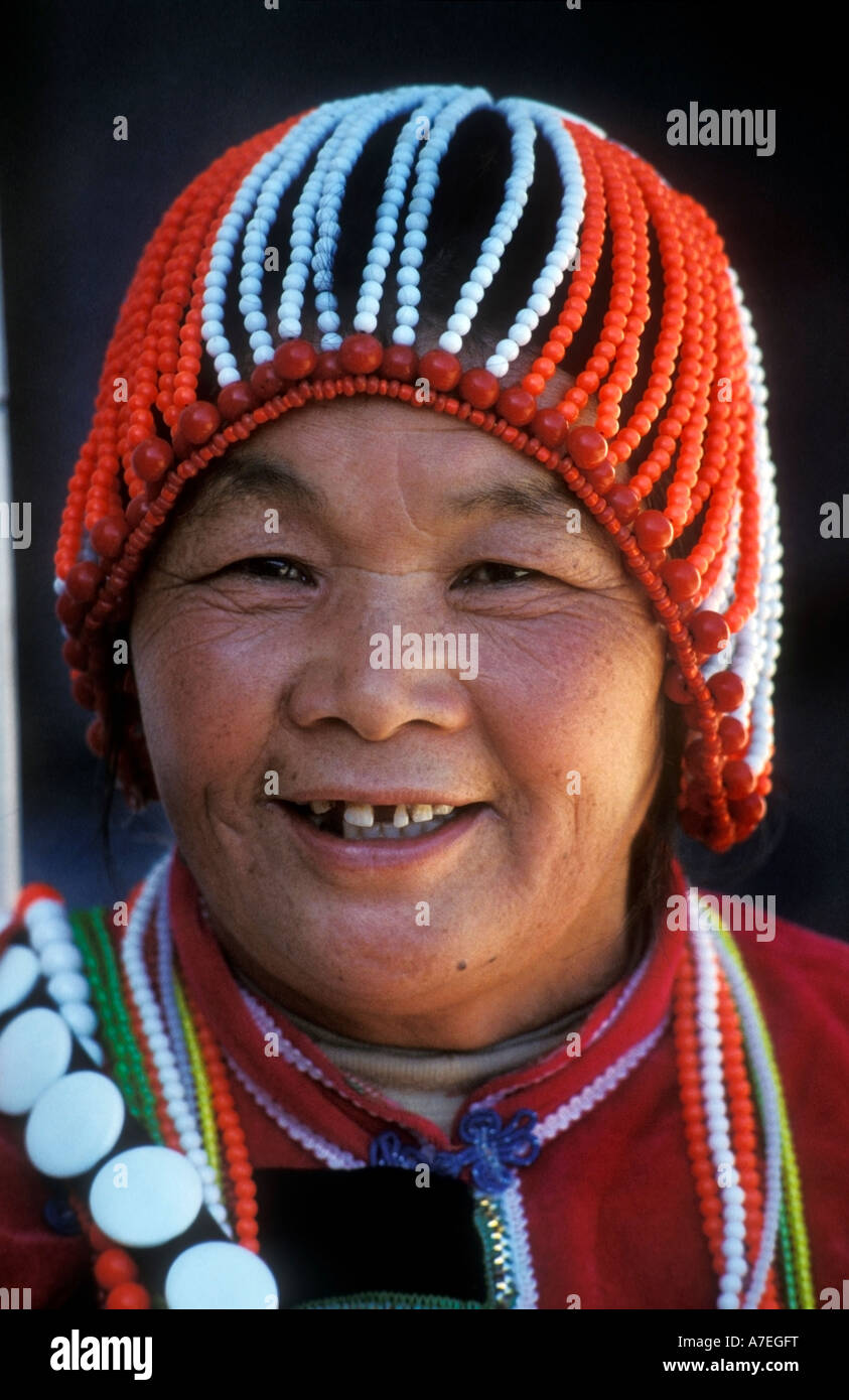 Old Lisu woman wearing traditional head dress Stock Photo - Alamy