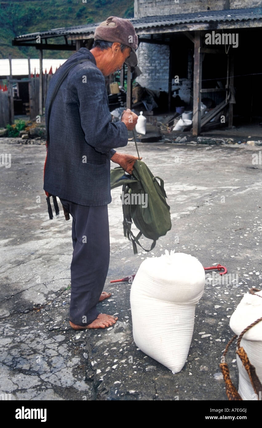 Man carry rice bag hi-res stock photography and images - Alamy