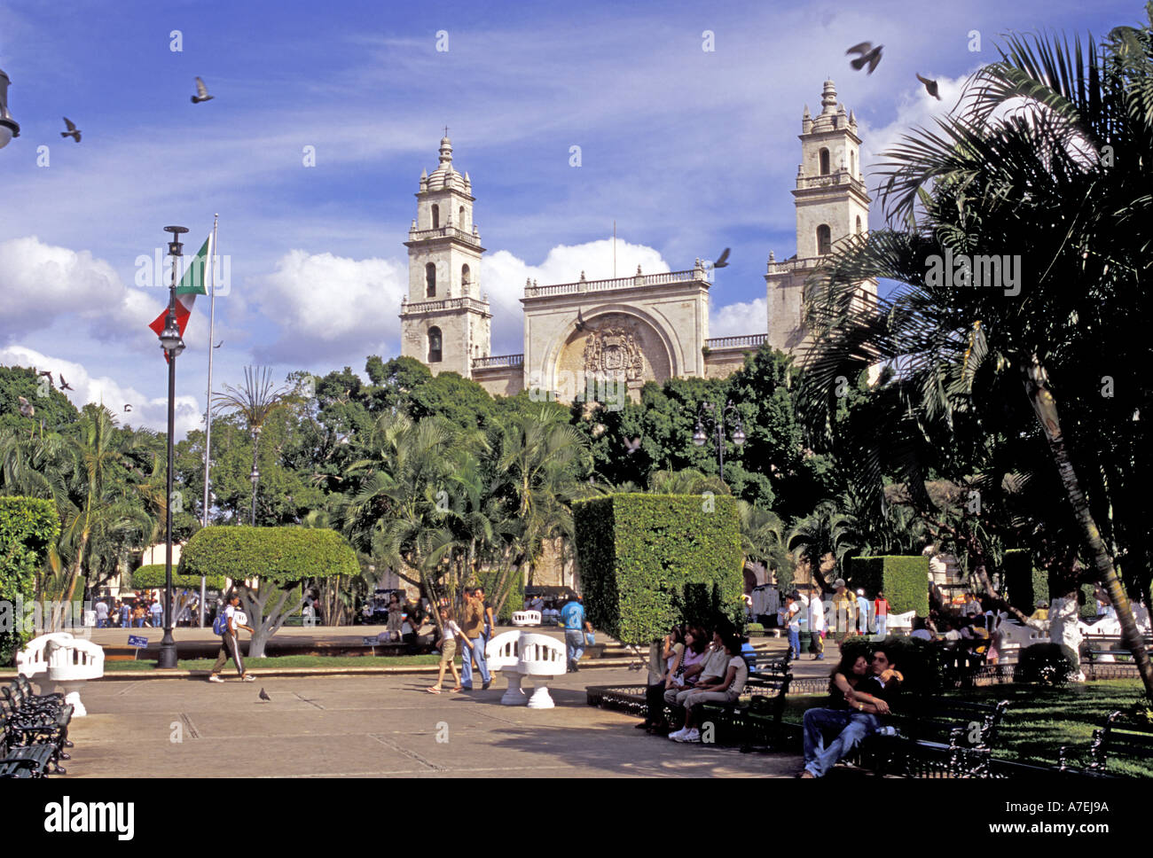 North America, Mexico, Yucatan, Merida. Mexican flag flying above main ...