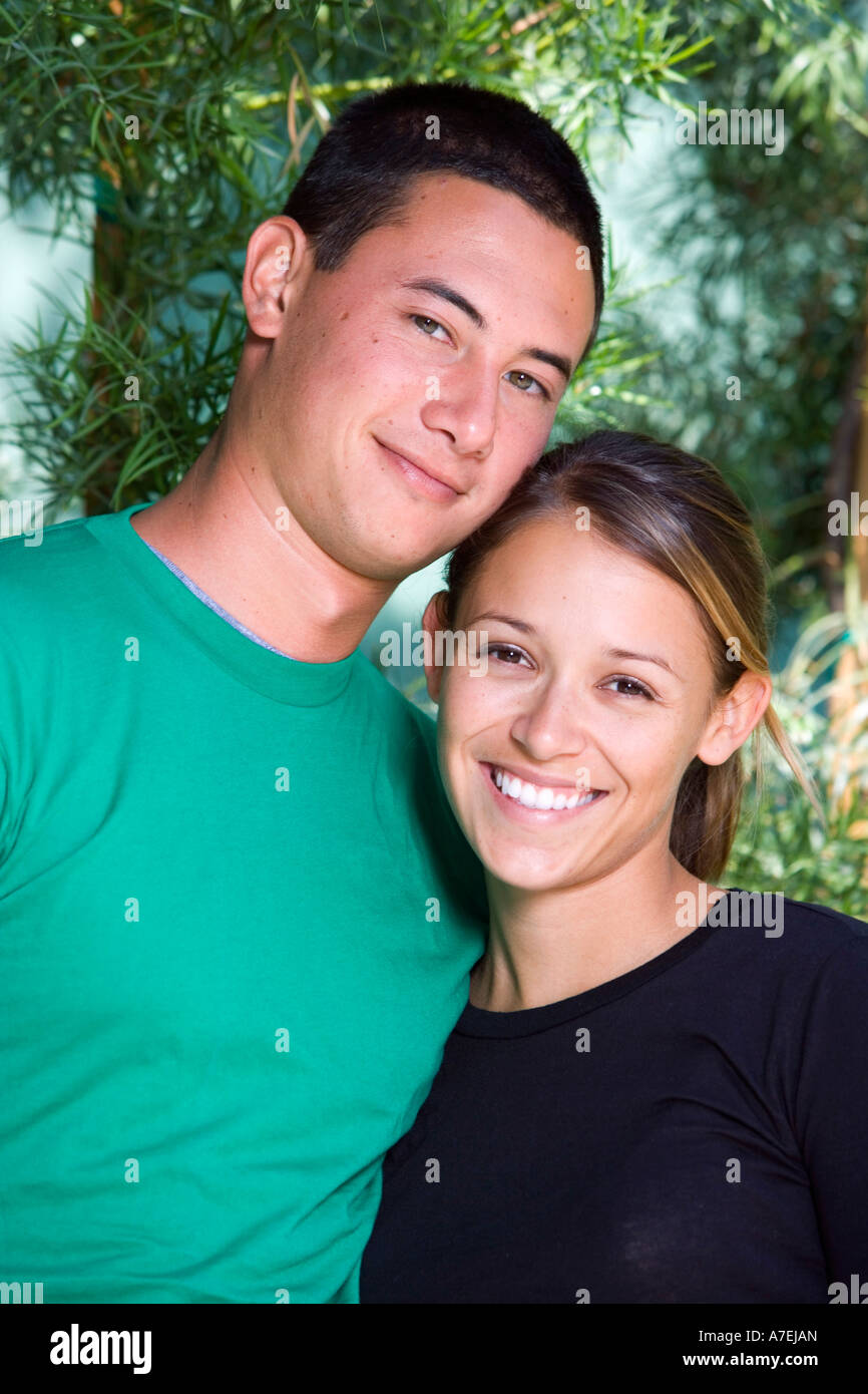 Portrait of bi-racial couple outdoors Stock Photo - Alamy