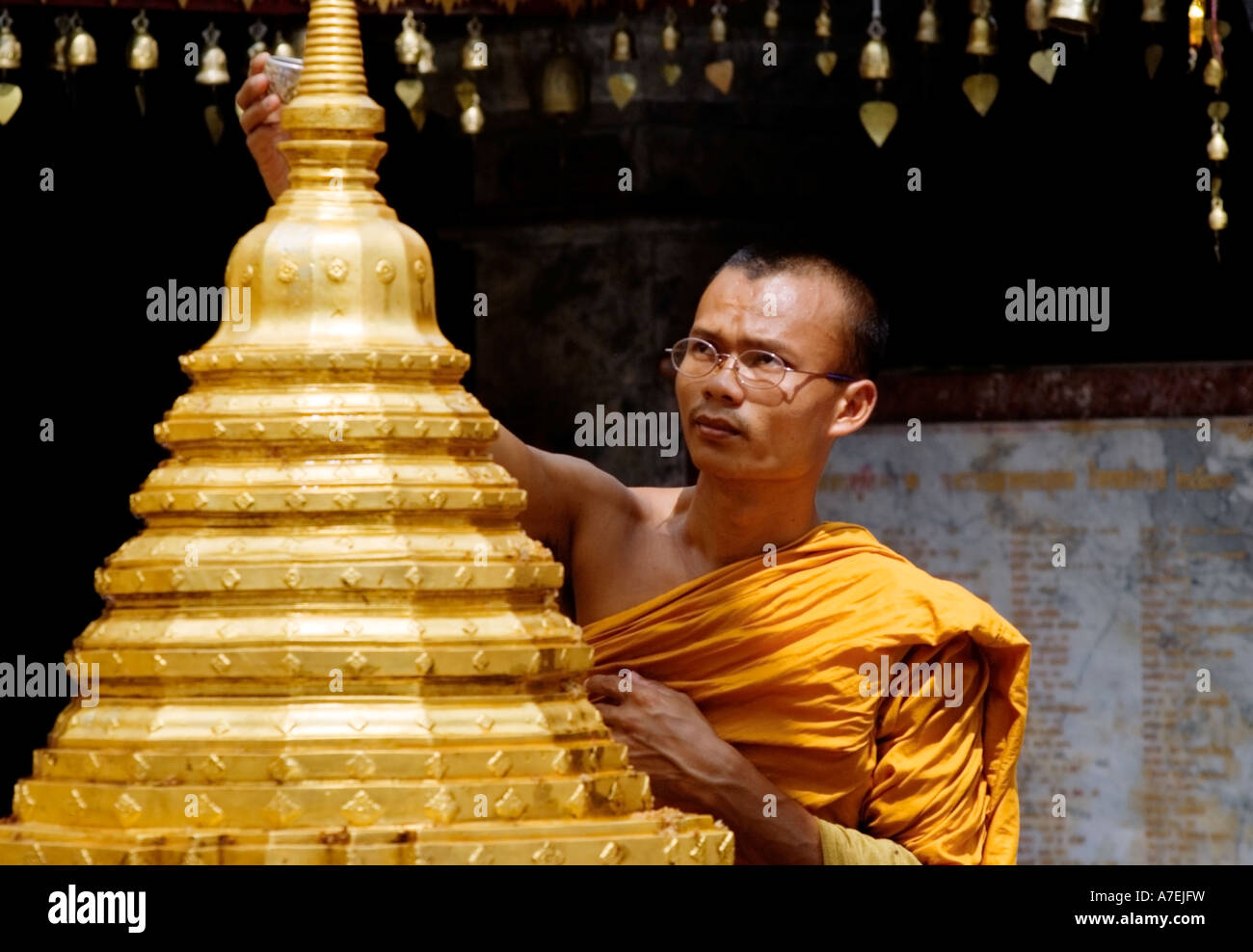 Buddhist monk wearing orange robe hi-res stock photography and images ...