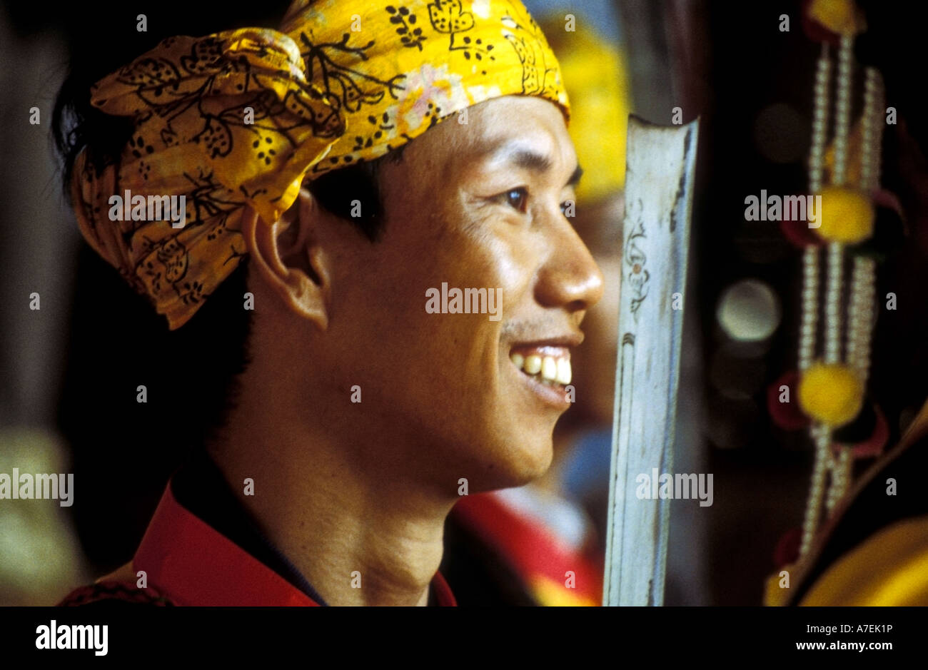 Hill tribe man in traditional clothing at a festival in northern ...