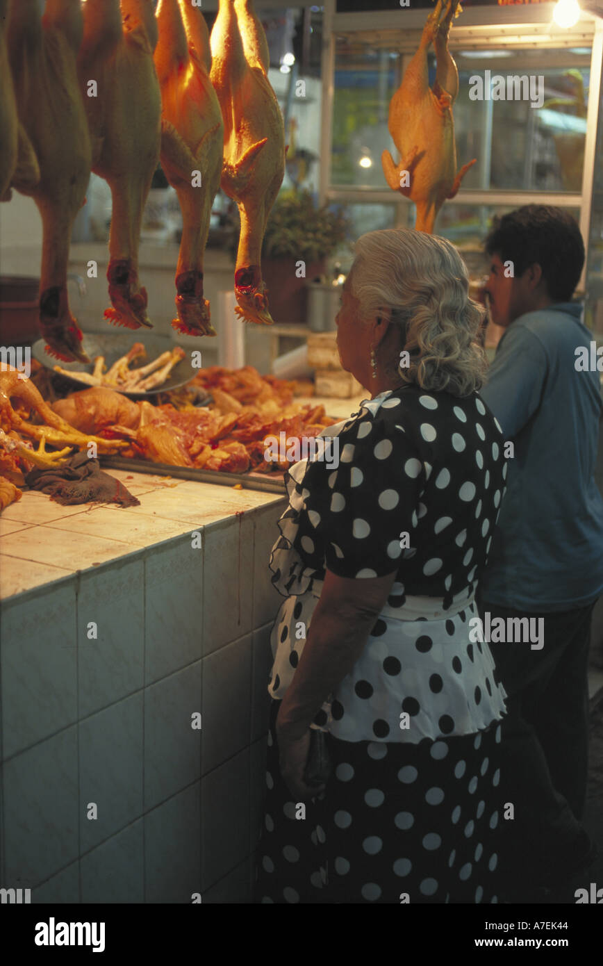 Mexico, Oaxaca, Woman shopping for chickens at market Stock Photo - Alamy