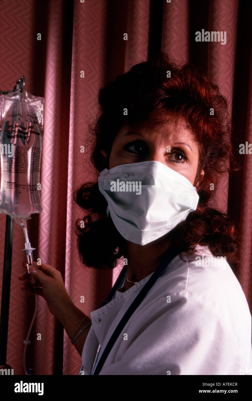 Female nurse with IV bag Stock Photo - Alamy