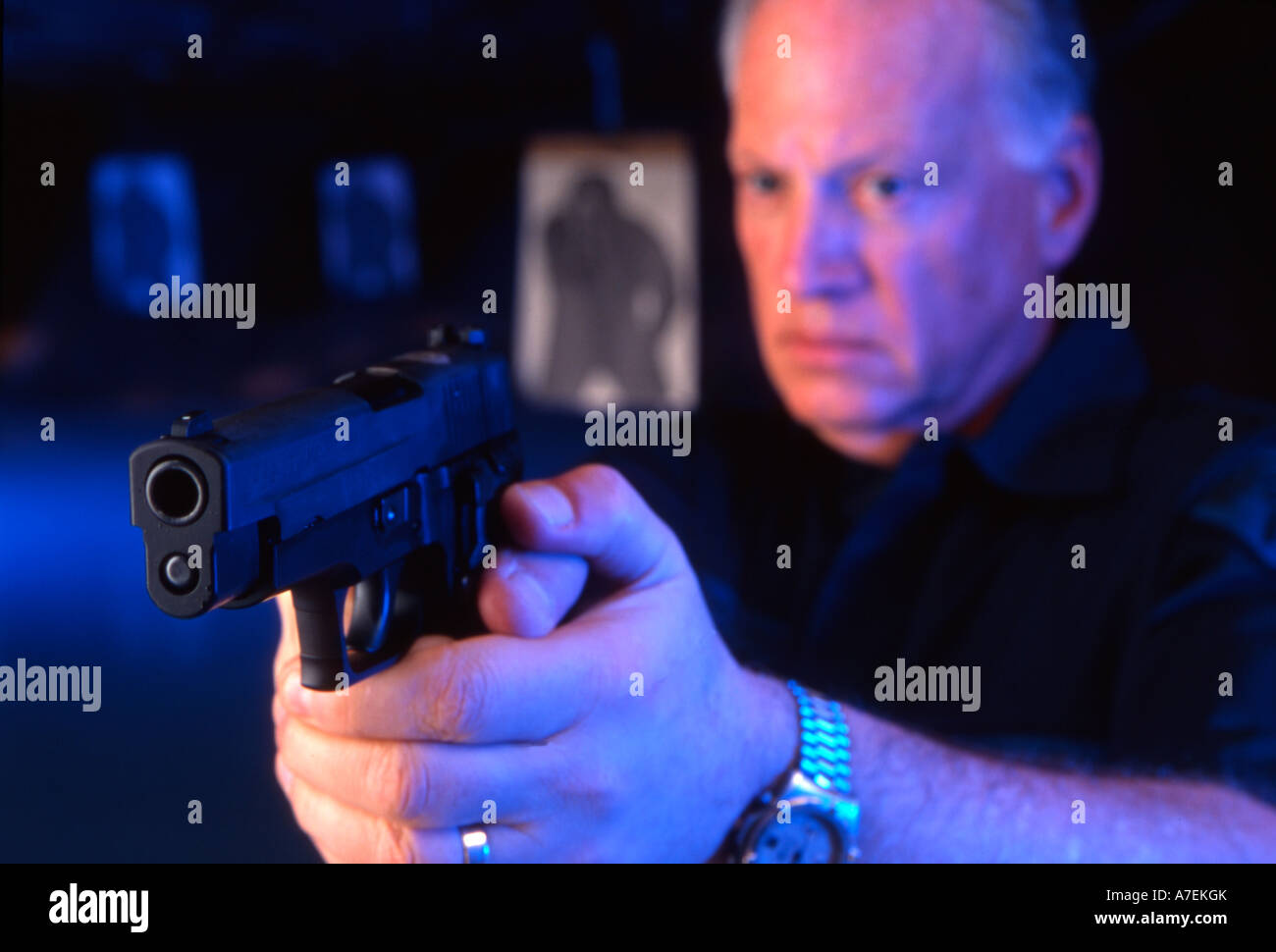 Policeman aiming with pistol hi-res stock photography and images - Alamy