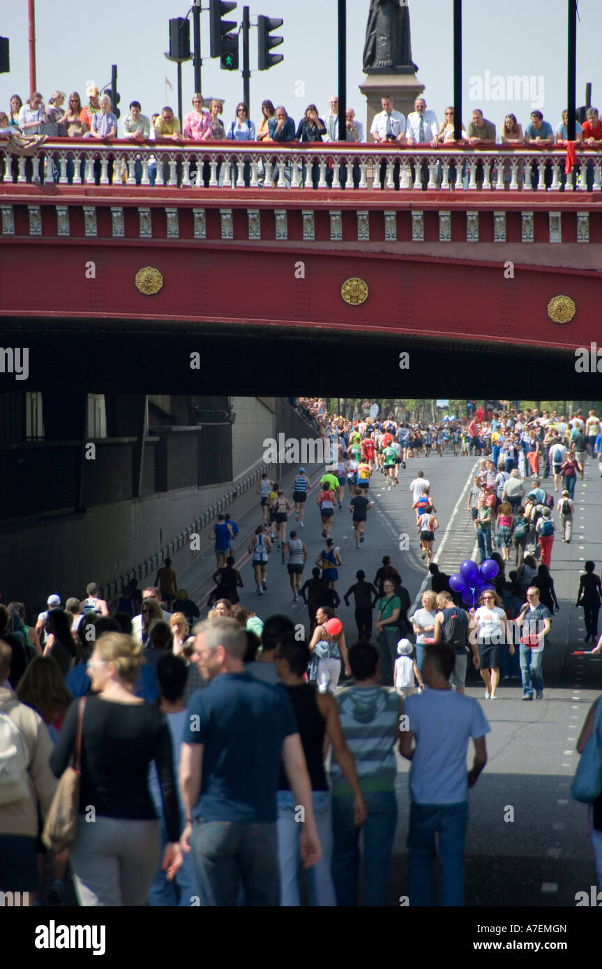 Crowds of spectators line the route of the 2007 London Marathon on the ...