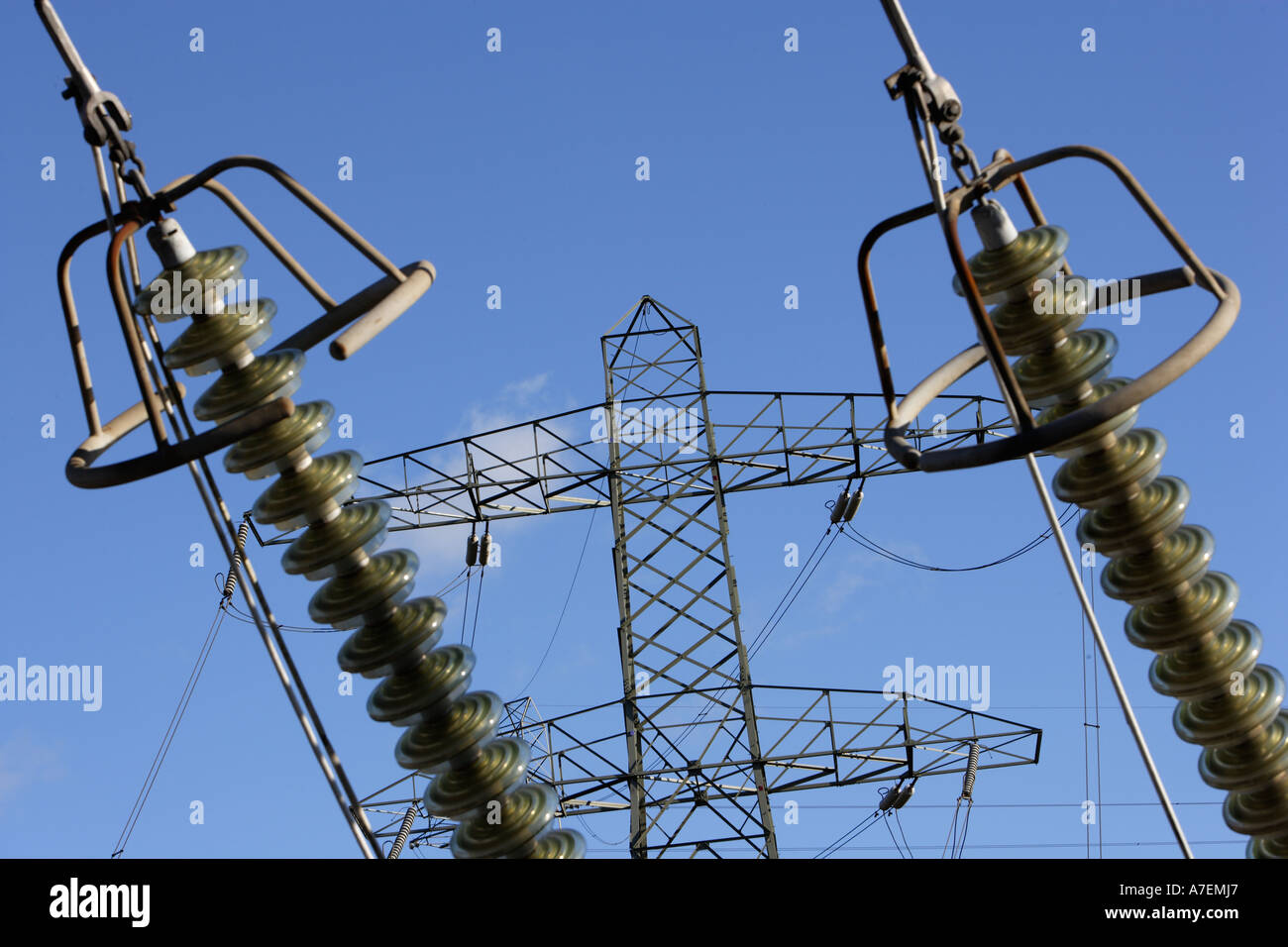 High Tension Enel Insulators and Electricity Pylon Stock Photo - Alamy