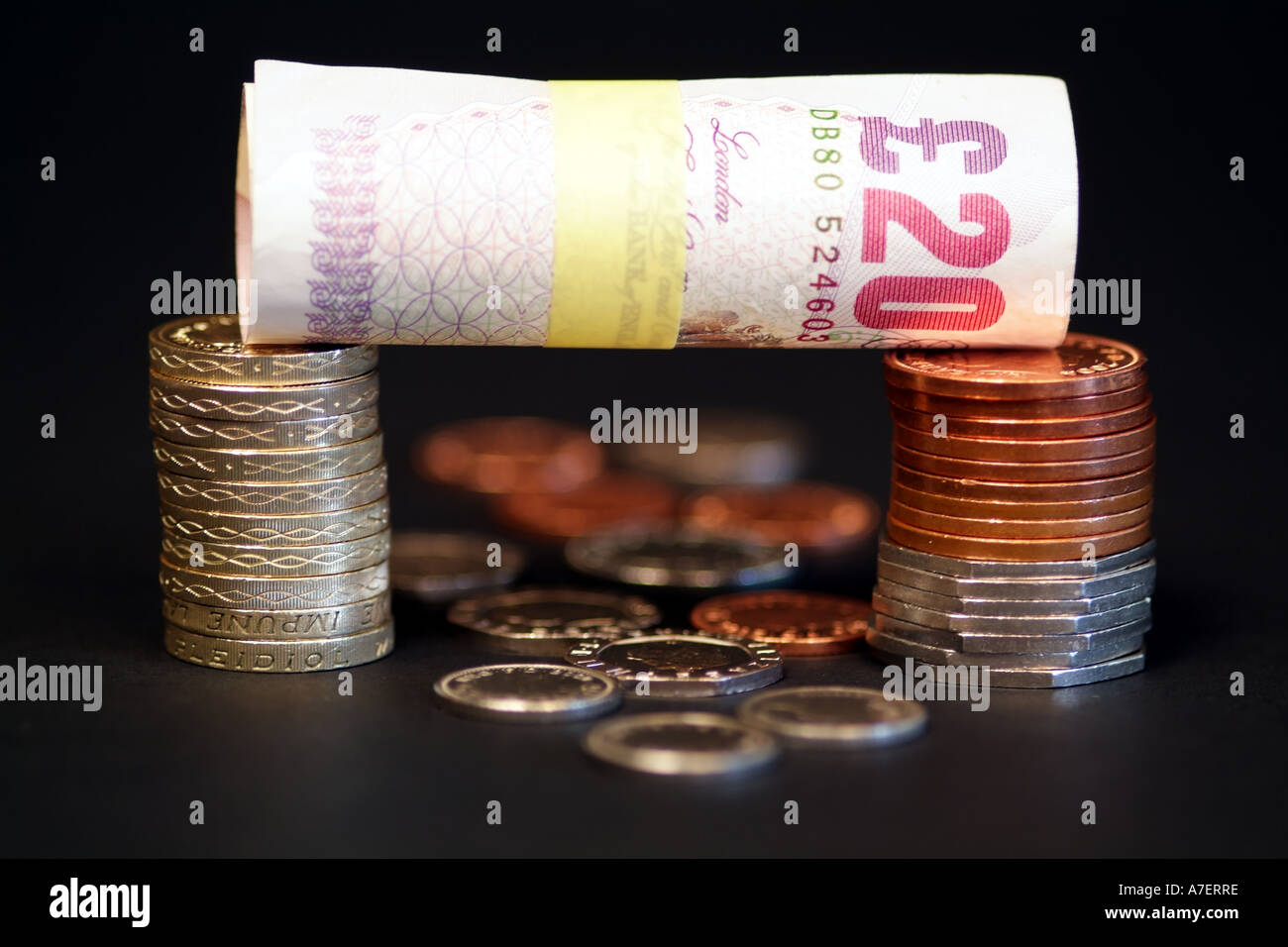 Roll of twenty pound notes hi-res stock photography and images - Alamy