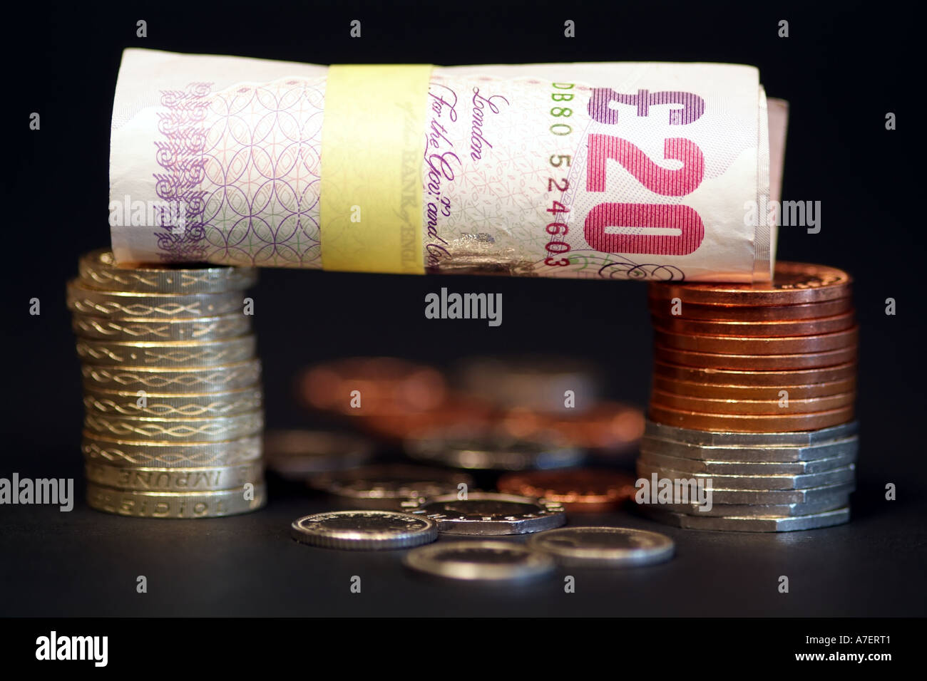 bridging loan roll of twenty pound notes form a bridge with british ...