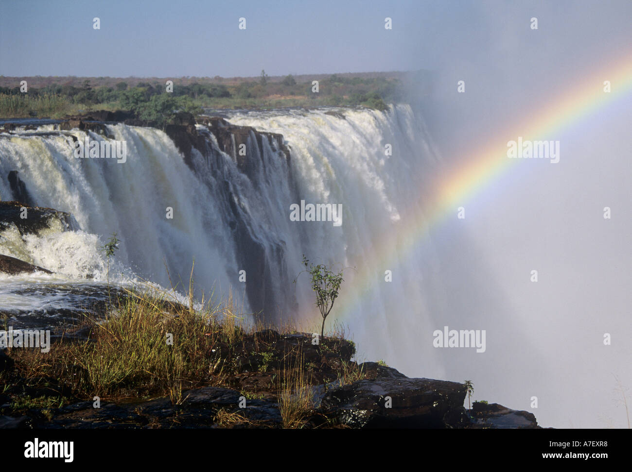 Rainbow over Victoria Falls in Zambia Stock Photo - Alamy