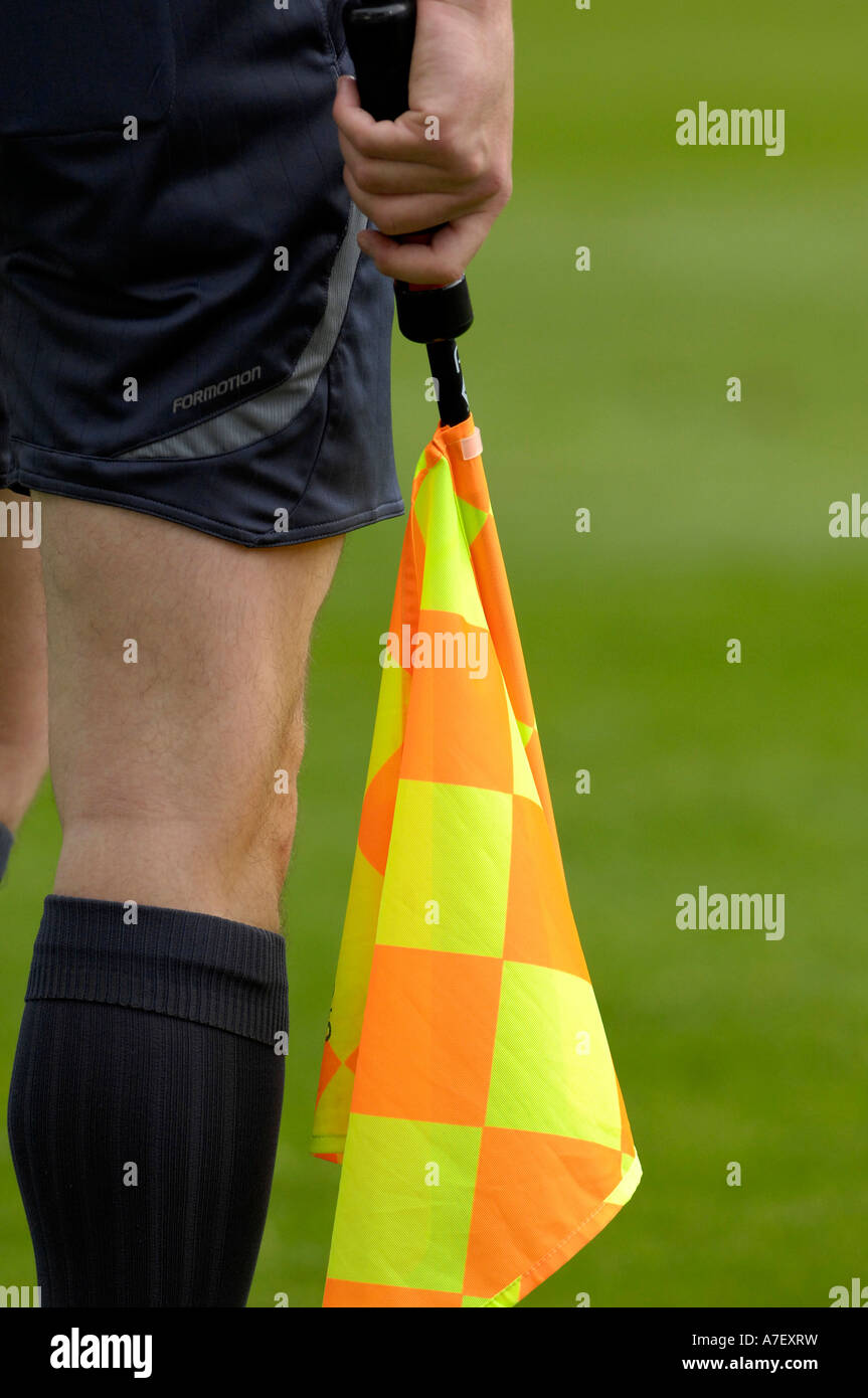 Linesman with flag Stock Photo - Alamy