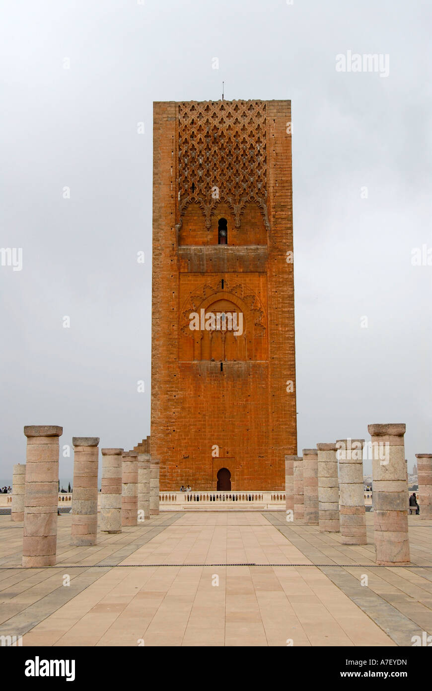 Unfinished minaret tower of Hassan with pillars at the square Rabat ...