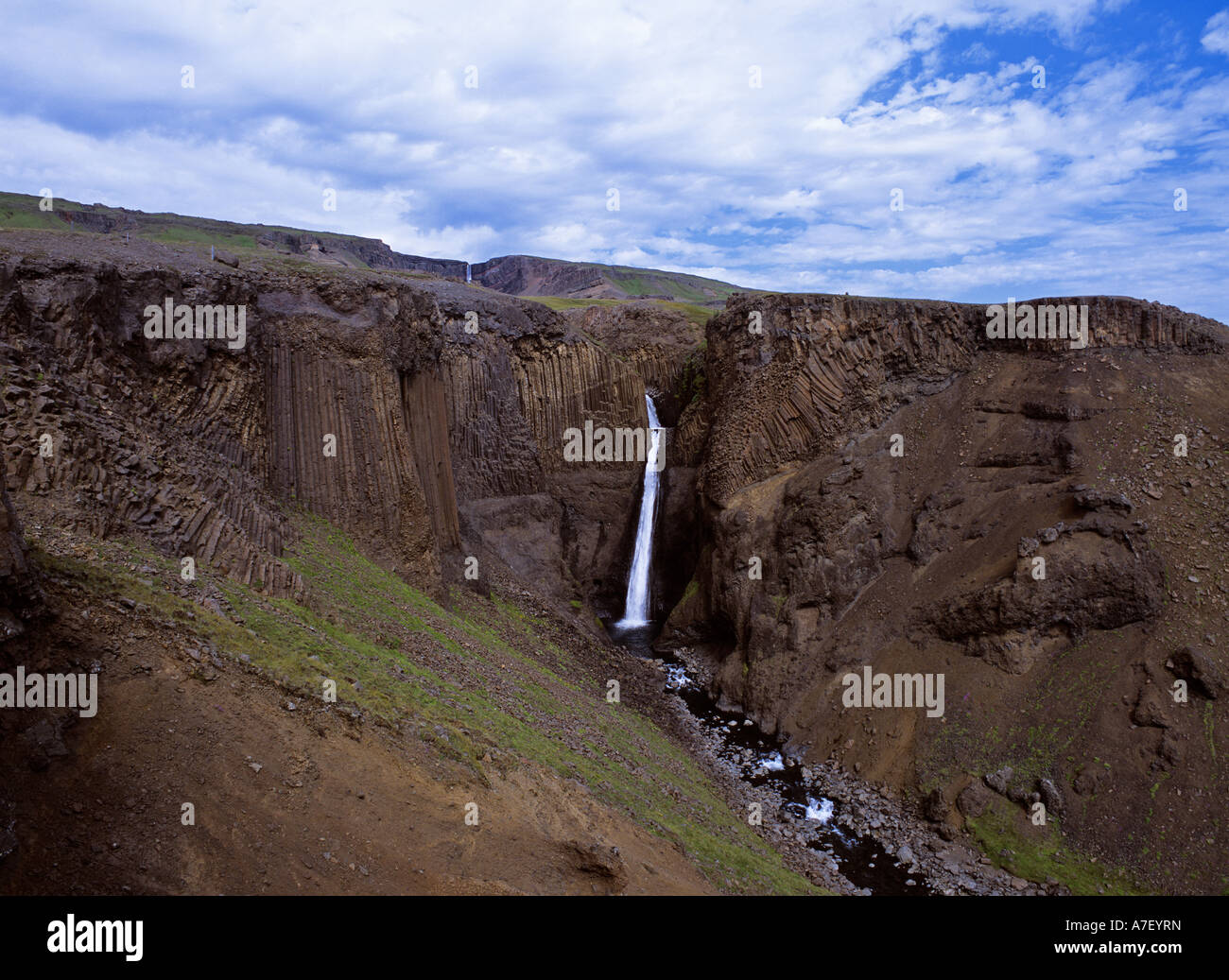 Waterfall Litlanesfoss surrounded by basalt columns, Iceland Stock ...