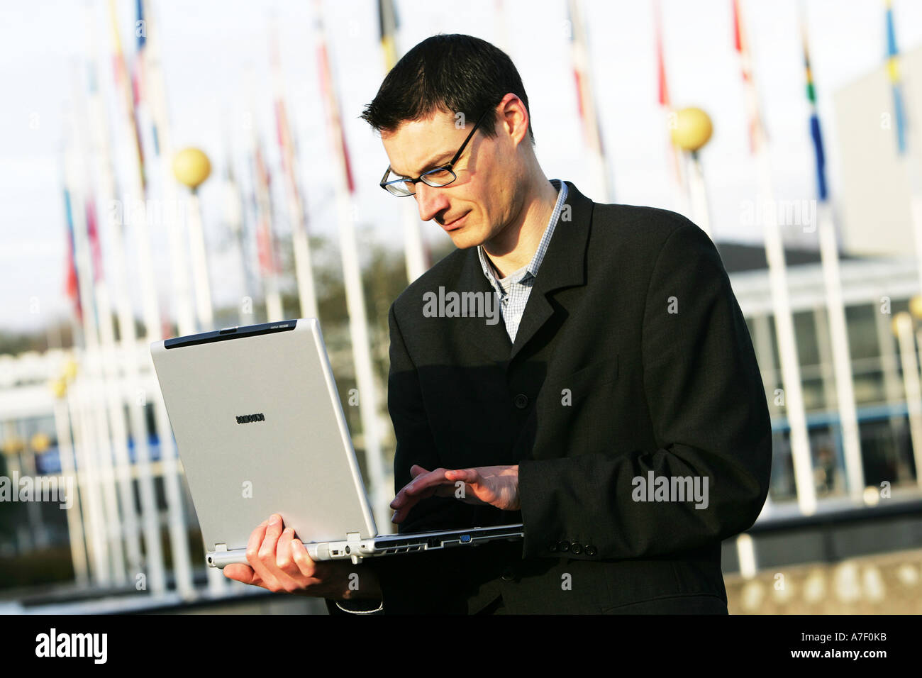 DEU, Germany : Man is working with a laptop computer Stock Photo - Alamy
