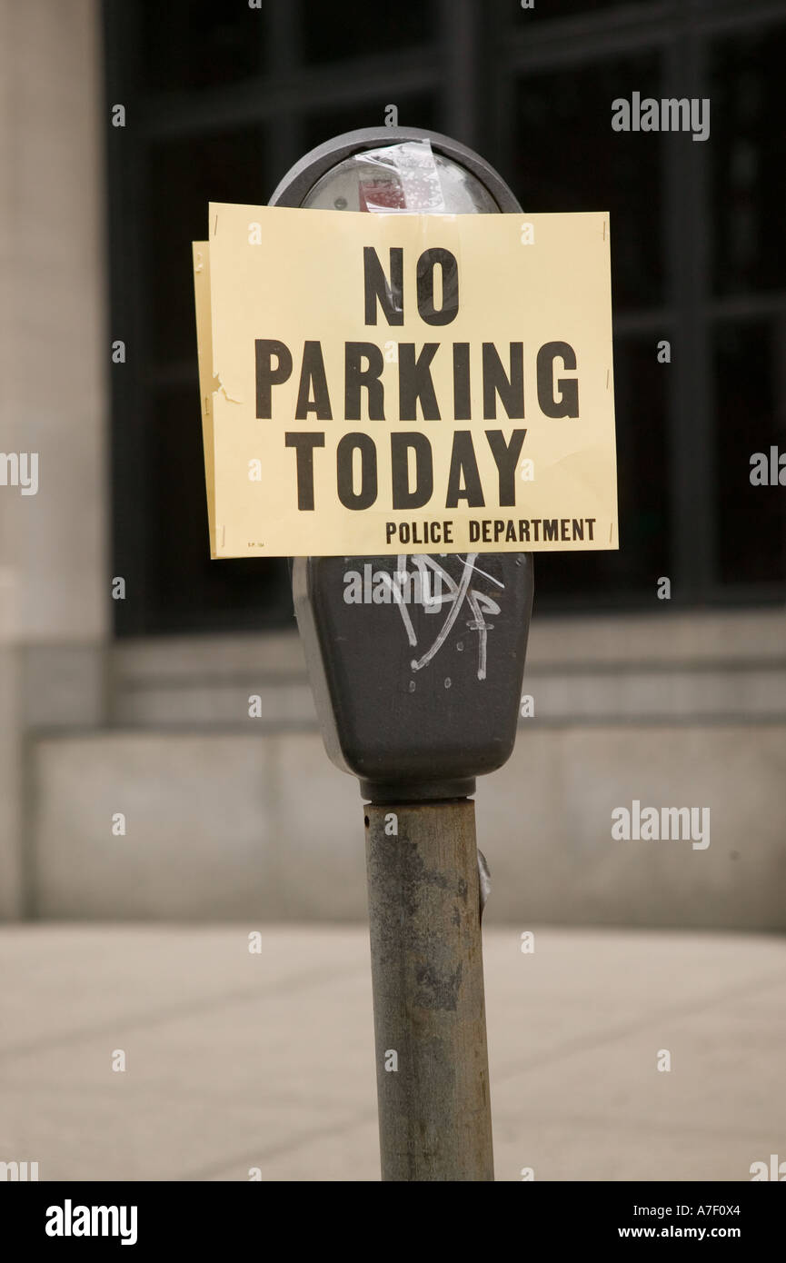 A No Parking Today paper sign is taped to a meter in New York City USA ...
