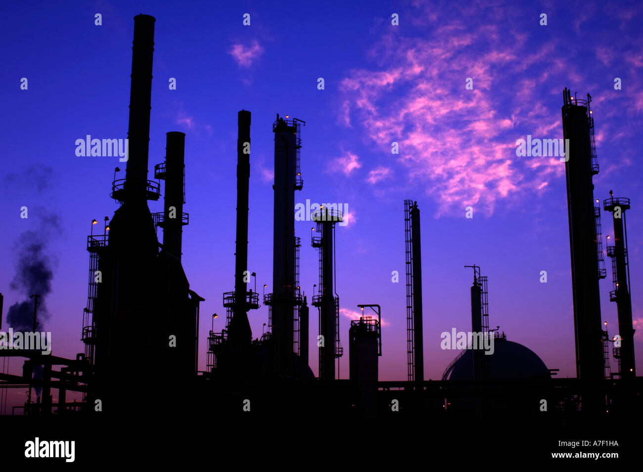 Oil Refinery At Sunset Or Sunrise Stock Photo - Alamy
