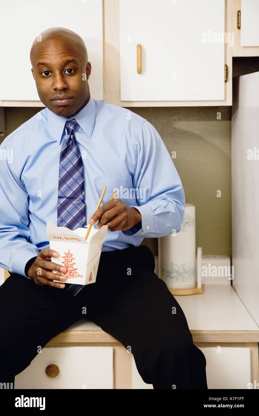 Black men eating out hi-res stock photography and images - Alamy