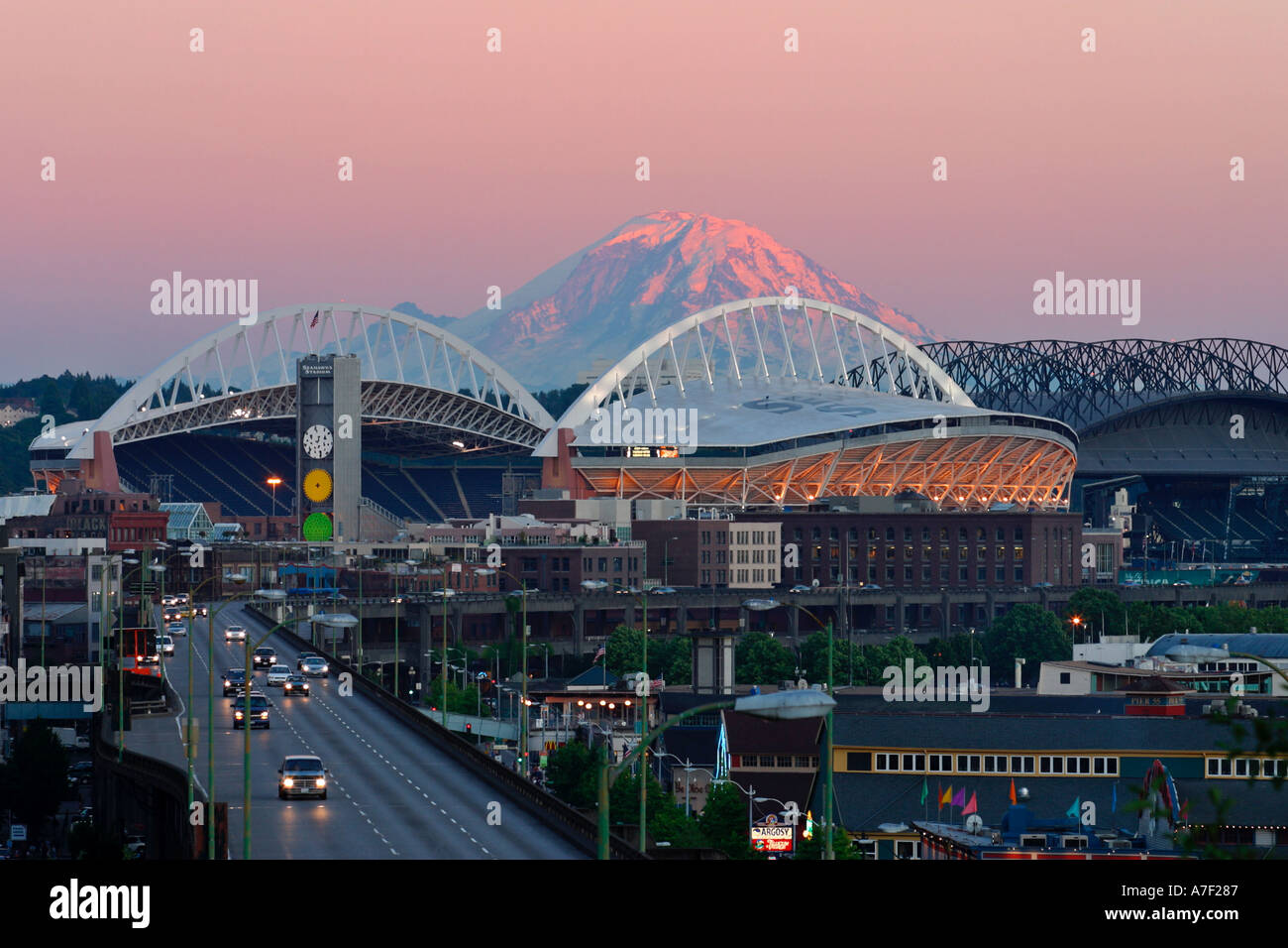 Seahawks Stadium and Safeco Field with Mt Rainier behind at sunset ...