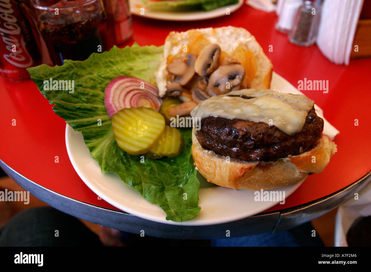 Large burger on a plate at the Island Burgers and shakes diner in New ...