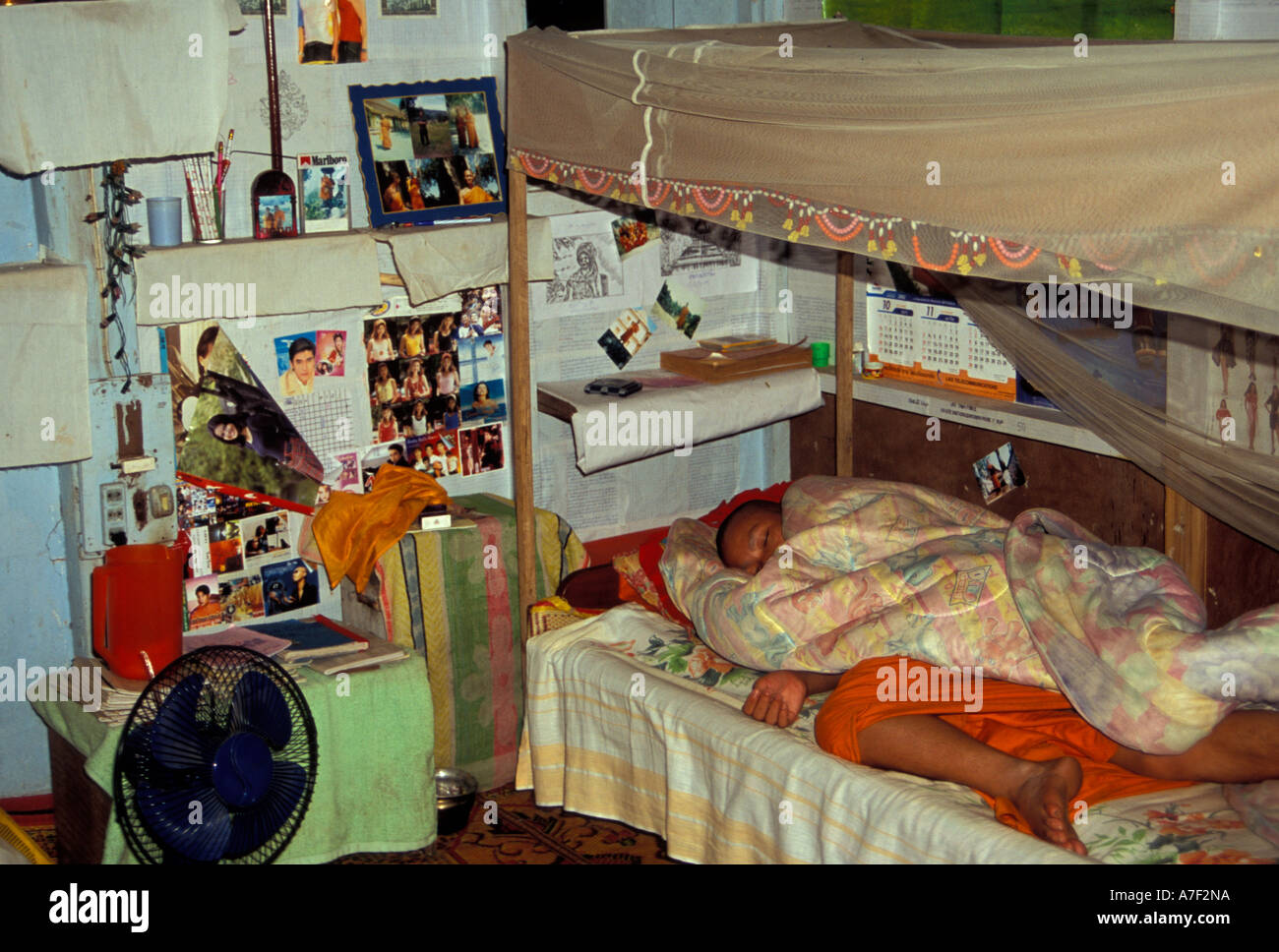 Sleeping Novice Monk in living quarters (kutis) on Mount Phousi, Luang ...