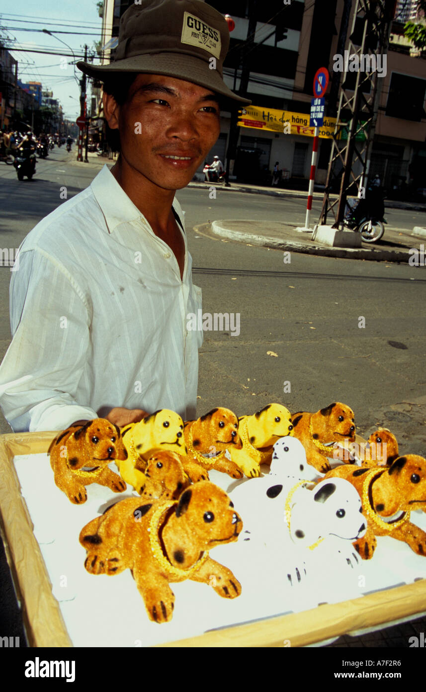 Nodding Dog Salesman, Ho Chi Minh City, Vietnam Stock Photo - Alamy