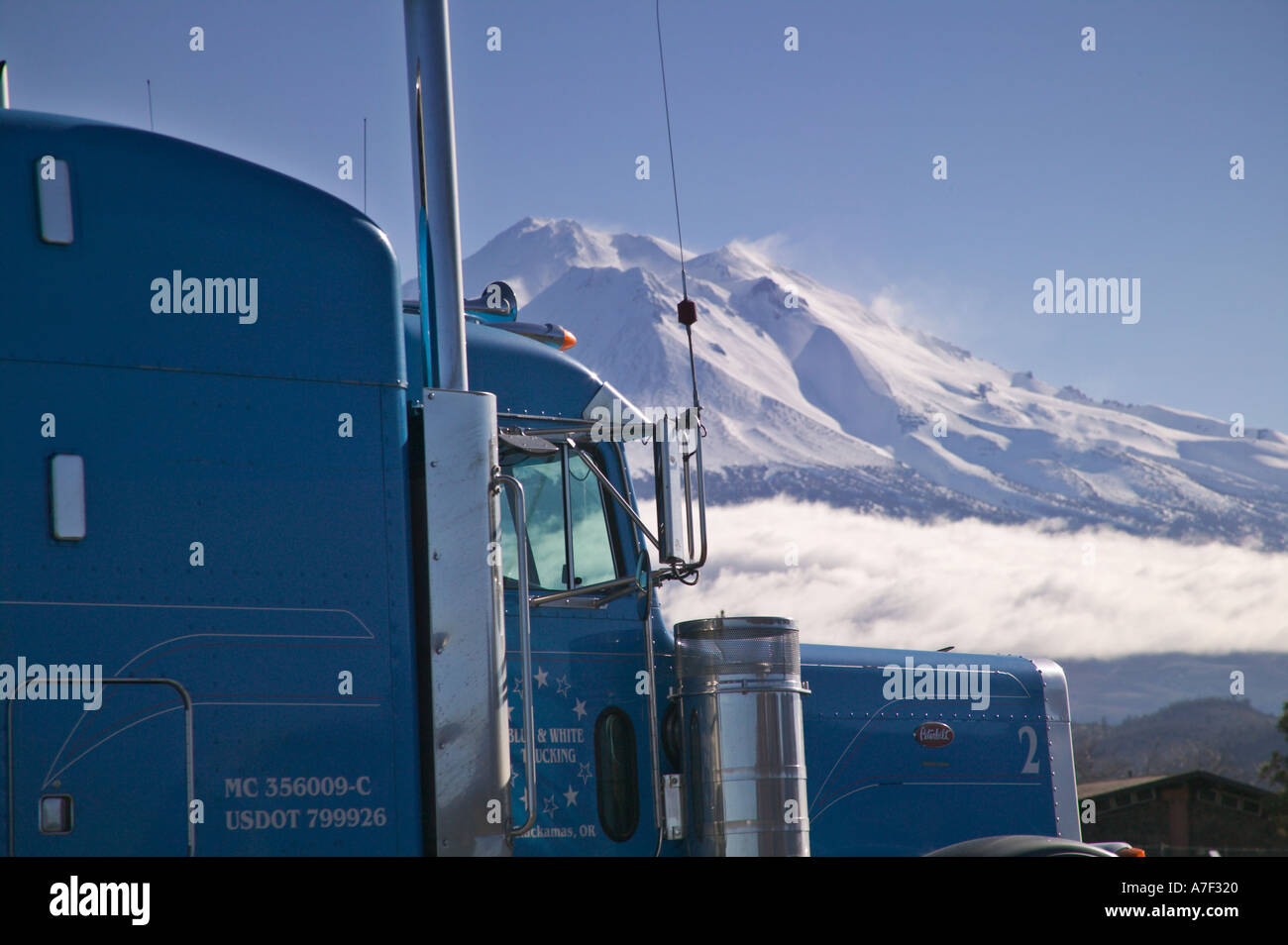 Long haul eighteen wheeler truck on Interstate 5 freeway passes Mt ...