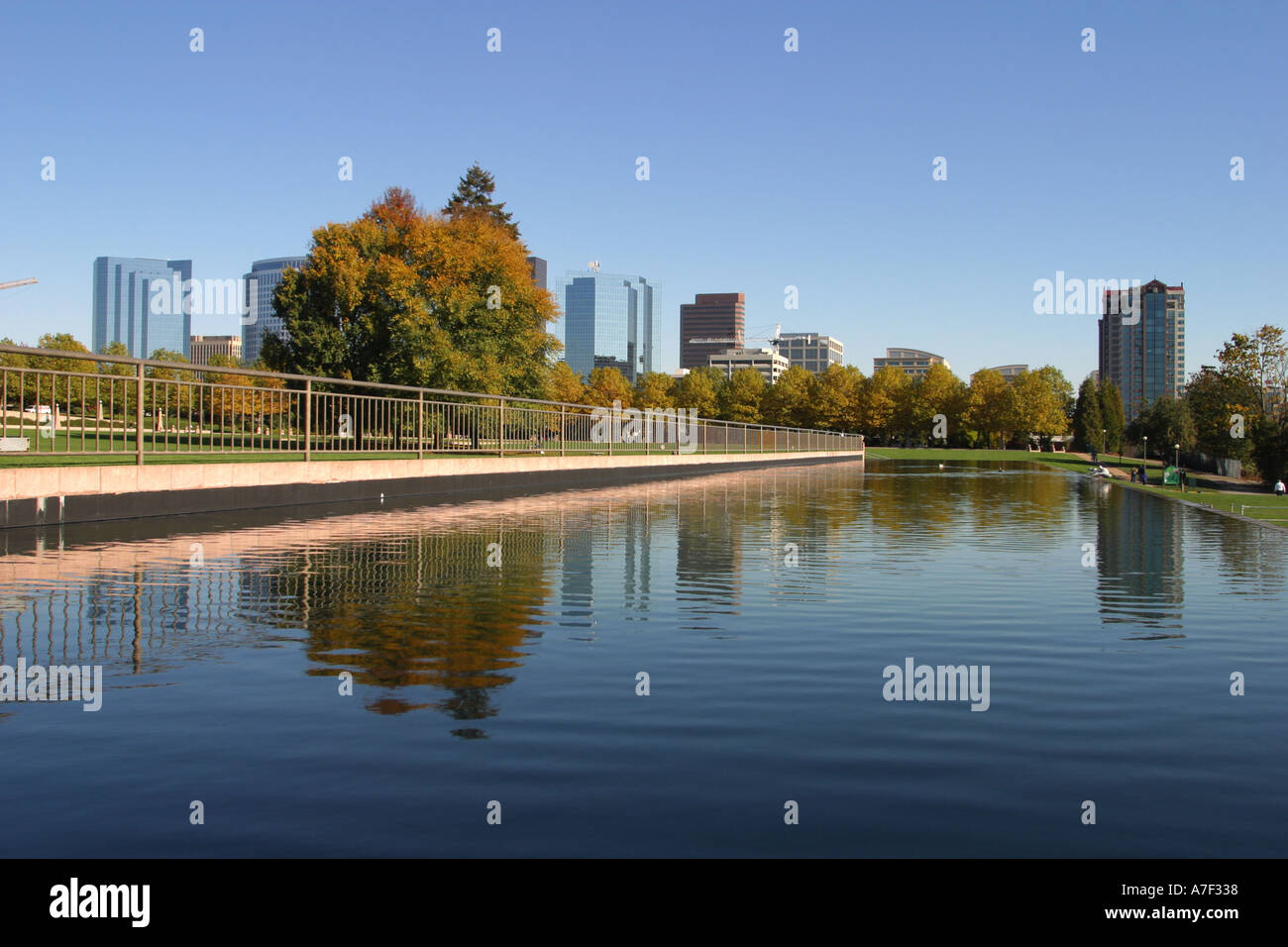 Waterfall and pond at Downtown Park with Bellevue Washingotn skyline in ...
