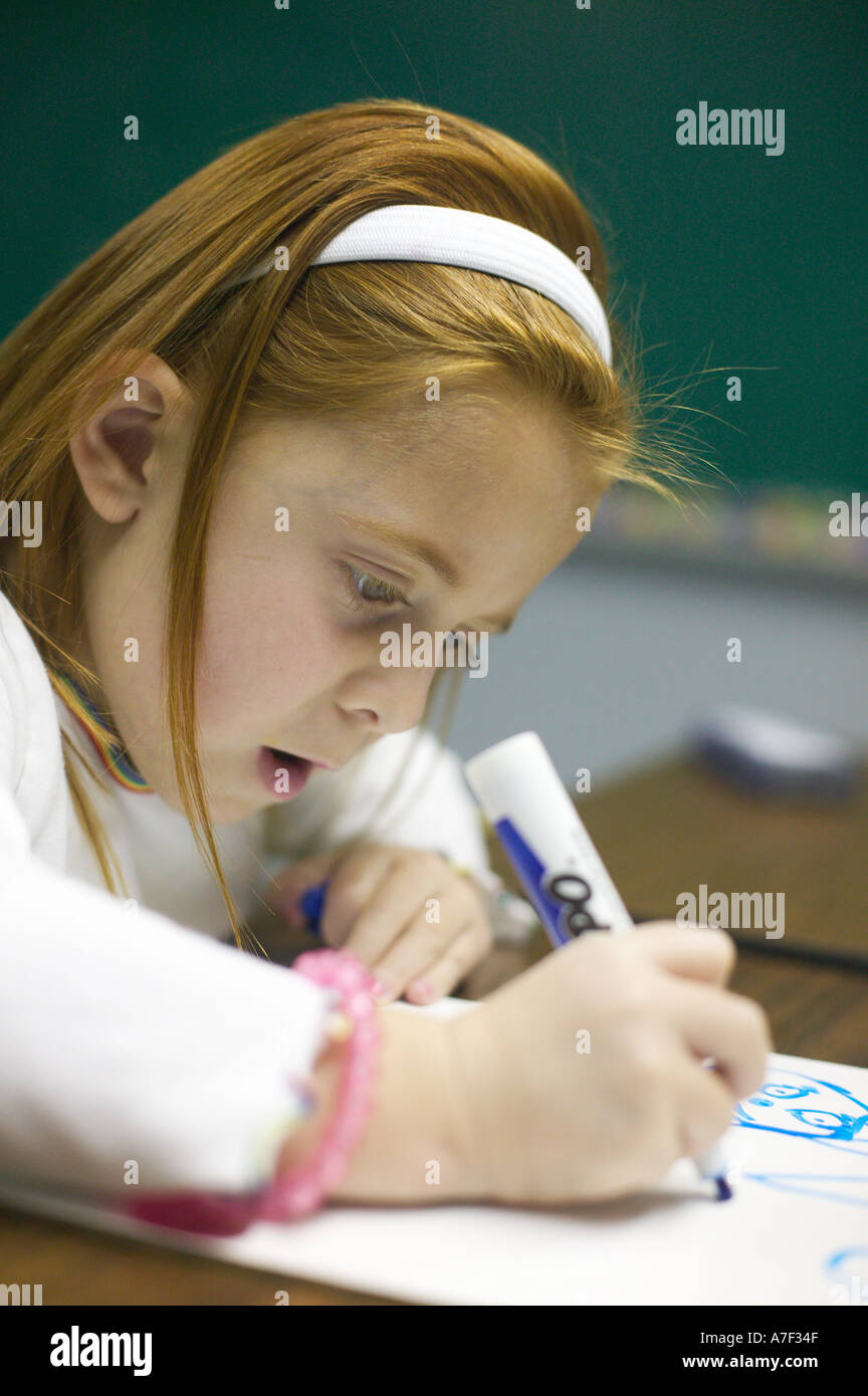Four year old writing hi-res stock photography and images - Alamy